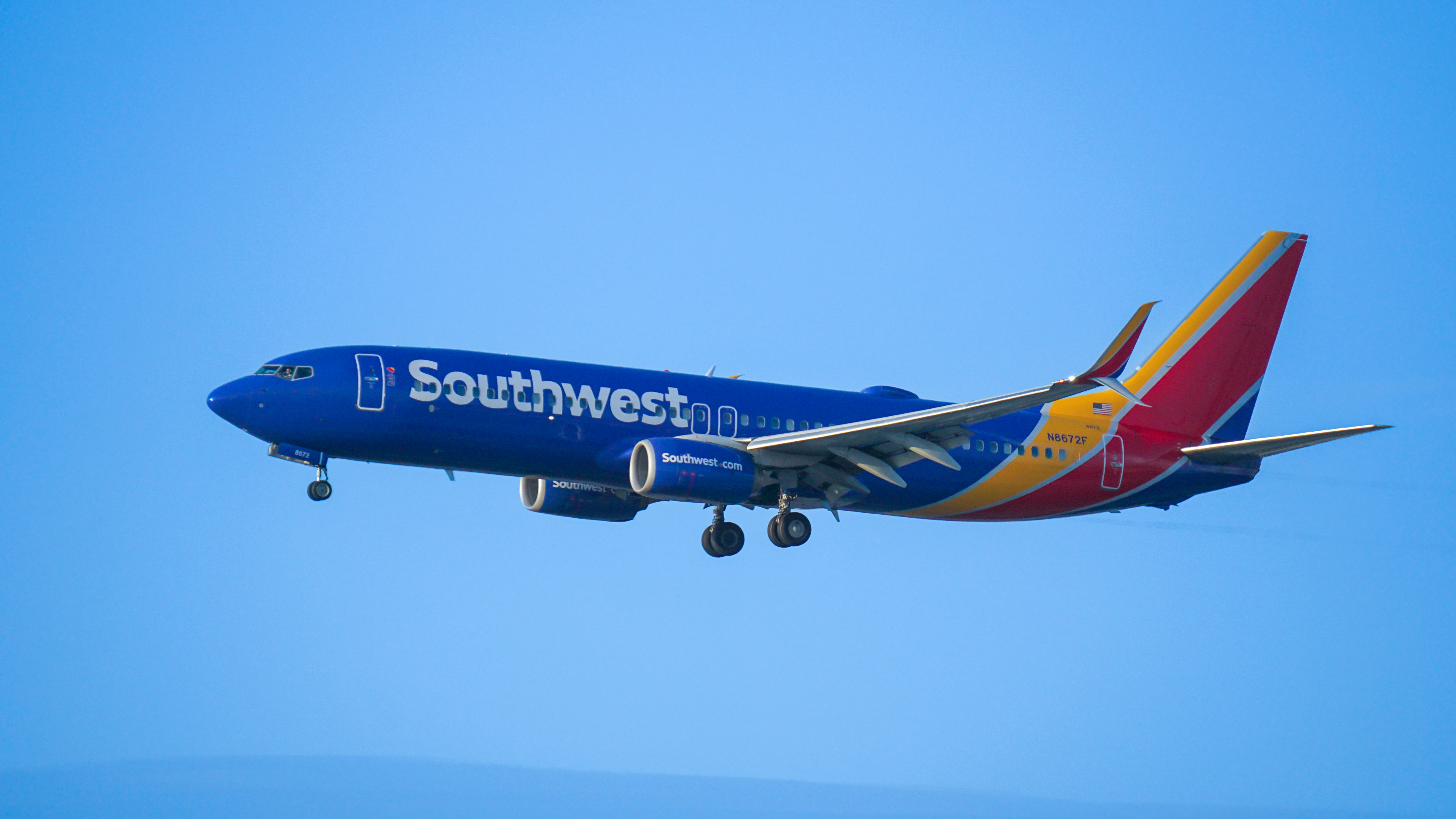 Southwest Bird in Blue Skies: A Bold Blue Jet on Approach