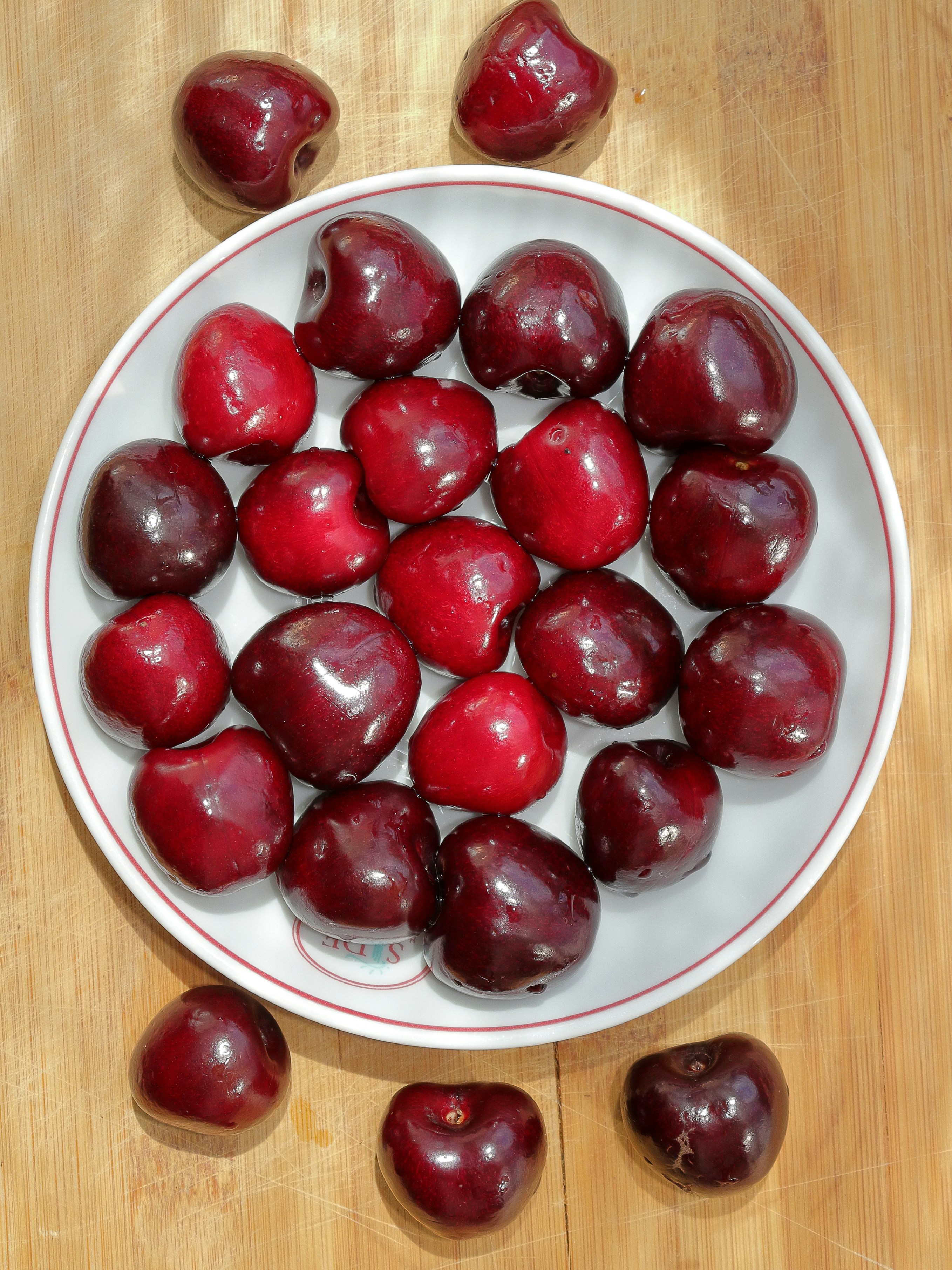 Cherries on a White Plate: A Red Cornucopia