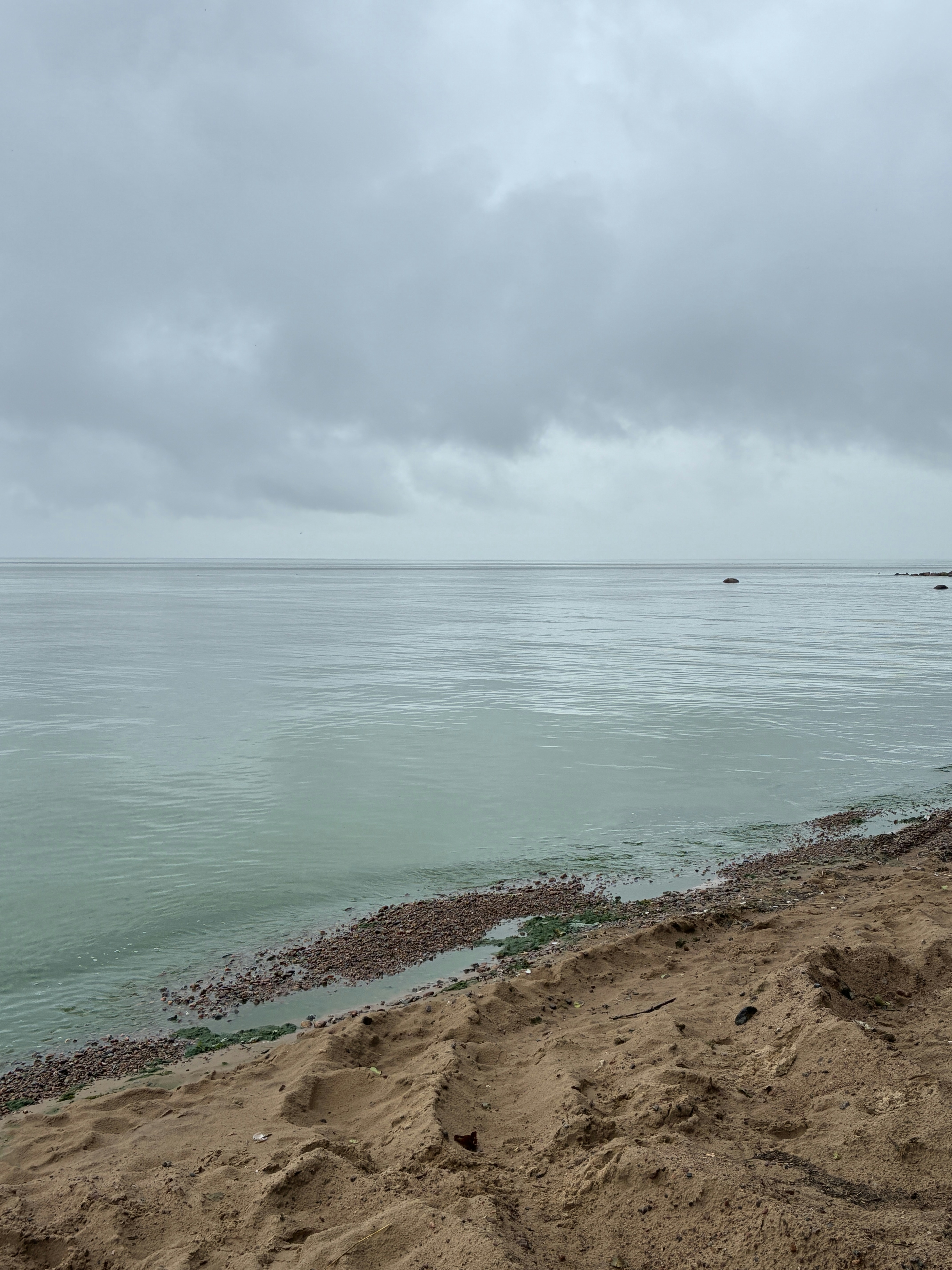 Coastal Horizon Under Troubled Skies