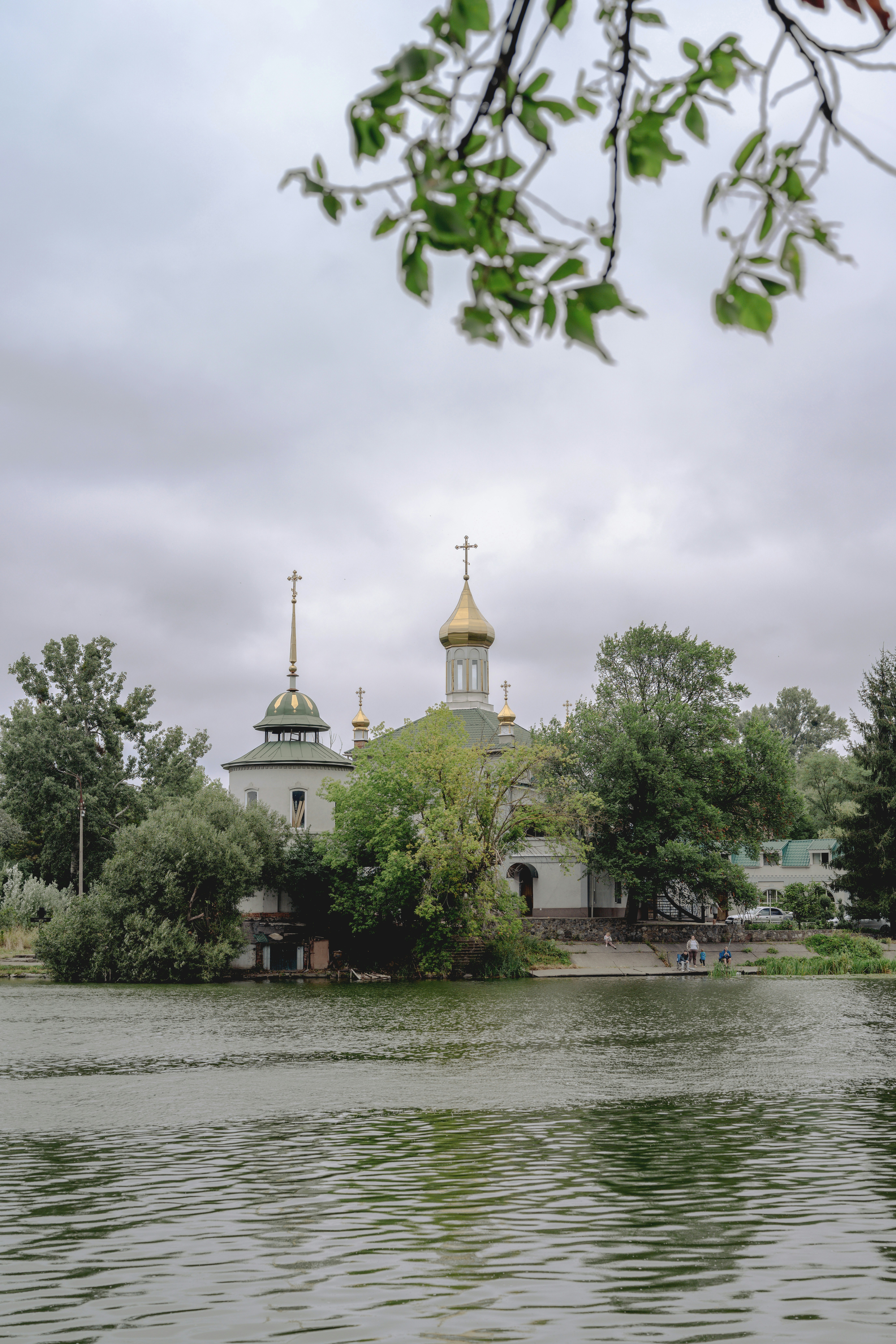 Whispering Pines Over a Quiet Monastery by the Lake