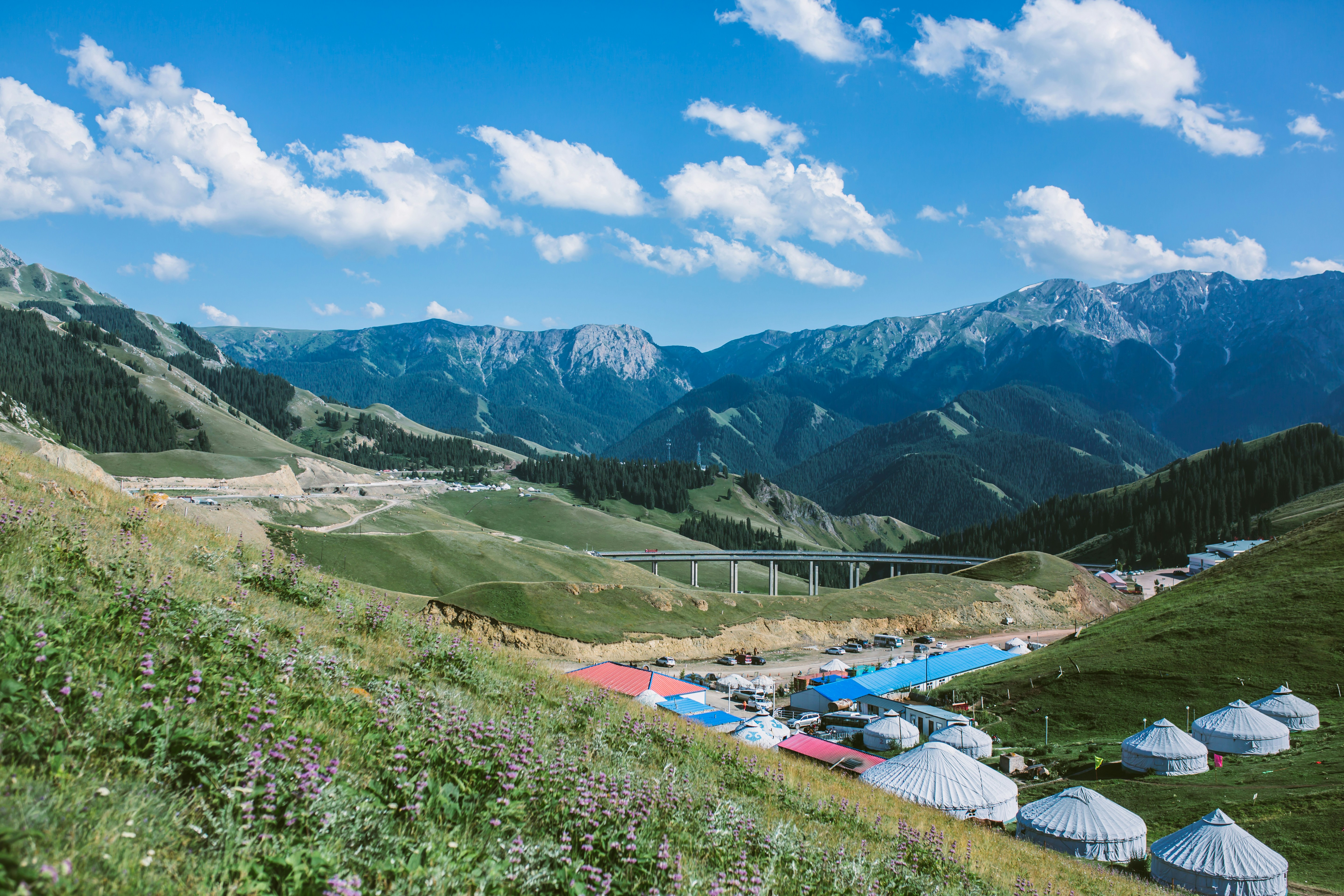 Sunlit Yurt Village Nestled in Alpine Valleys