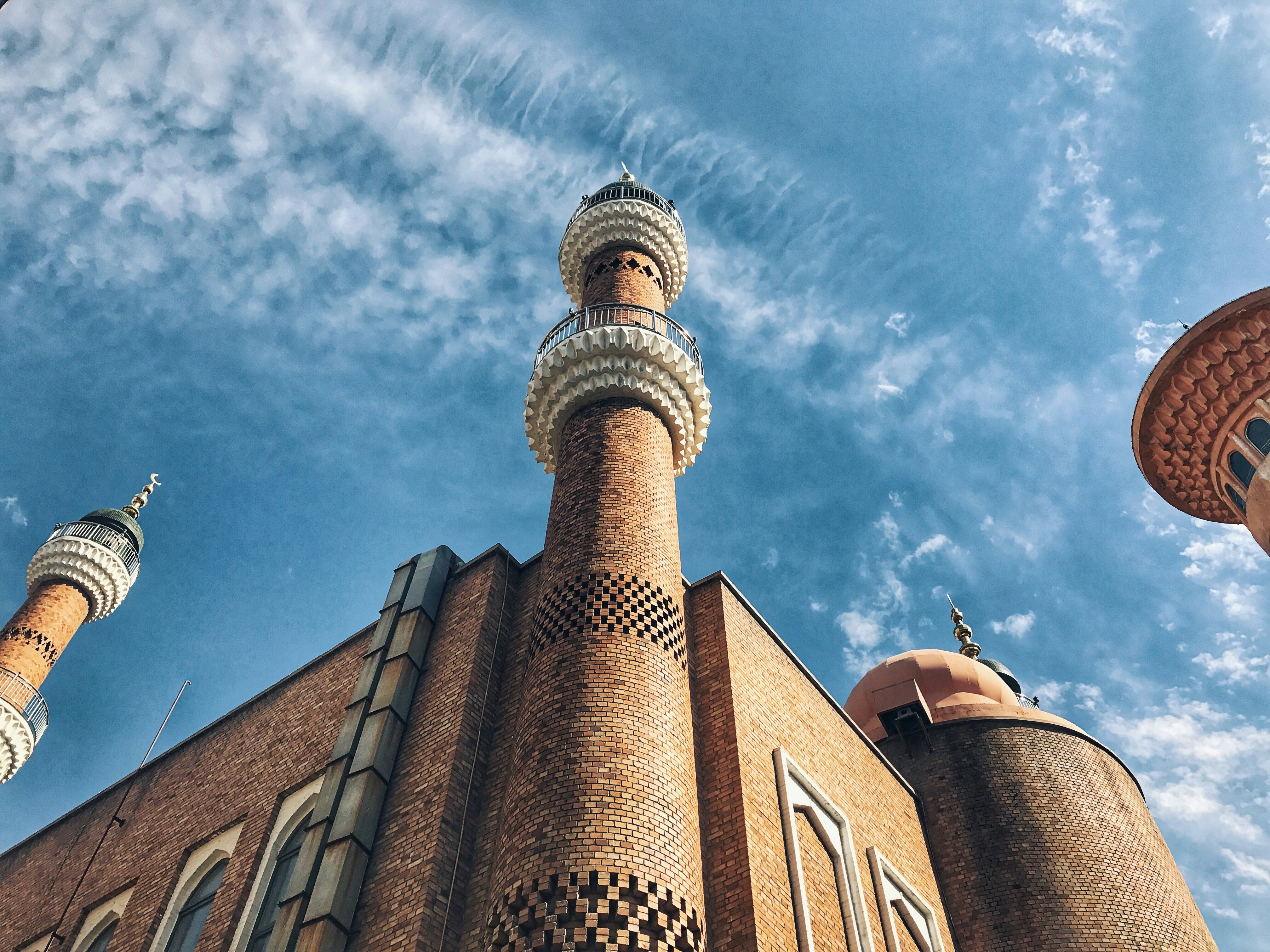 Brick Minarets Against a Blue Sky