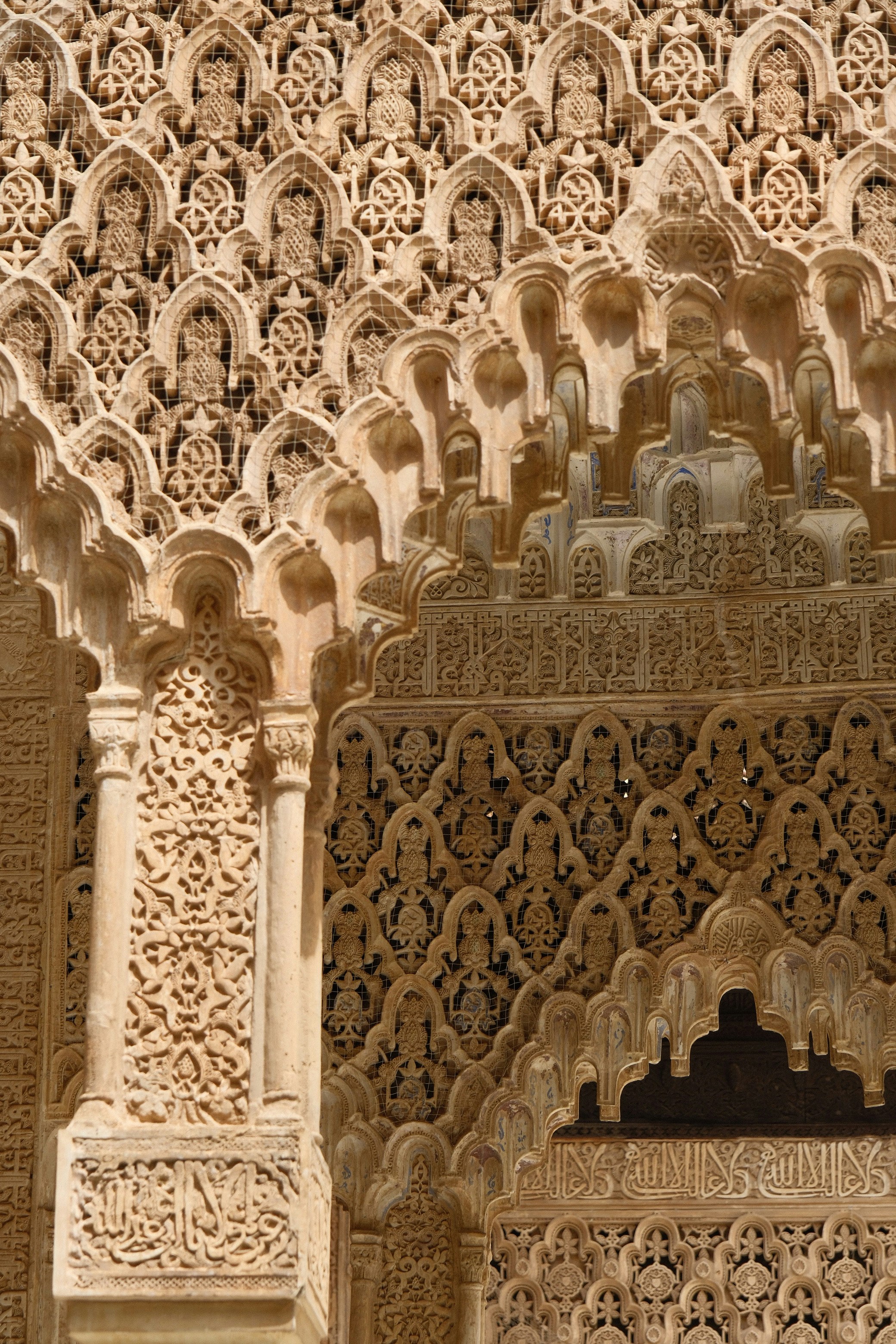 Ornate Carved Archways: A Study in Repetition and Light