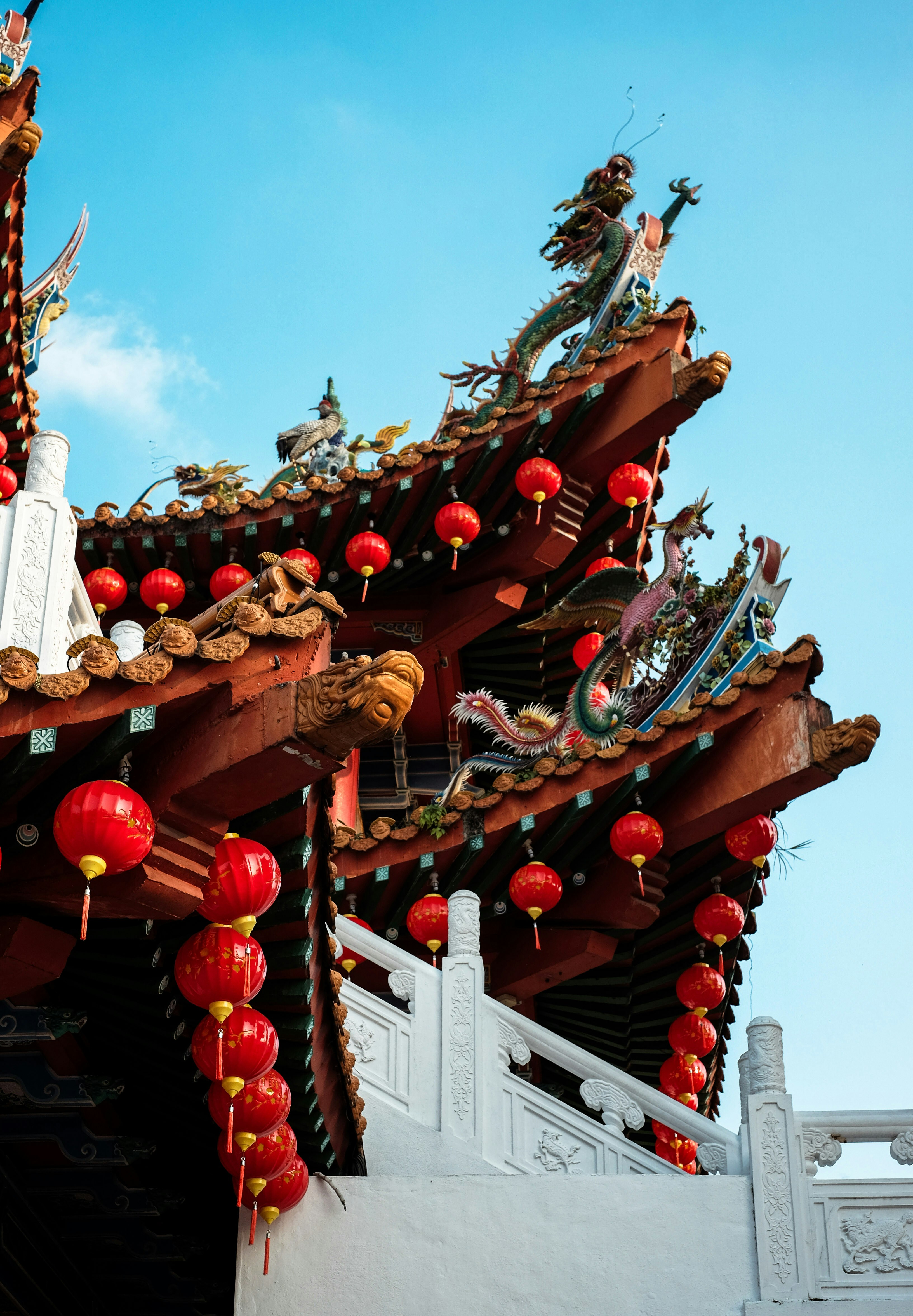 Dragon Carvings and Red Orbs: A Corner of Celebration