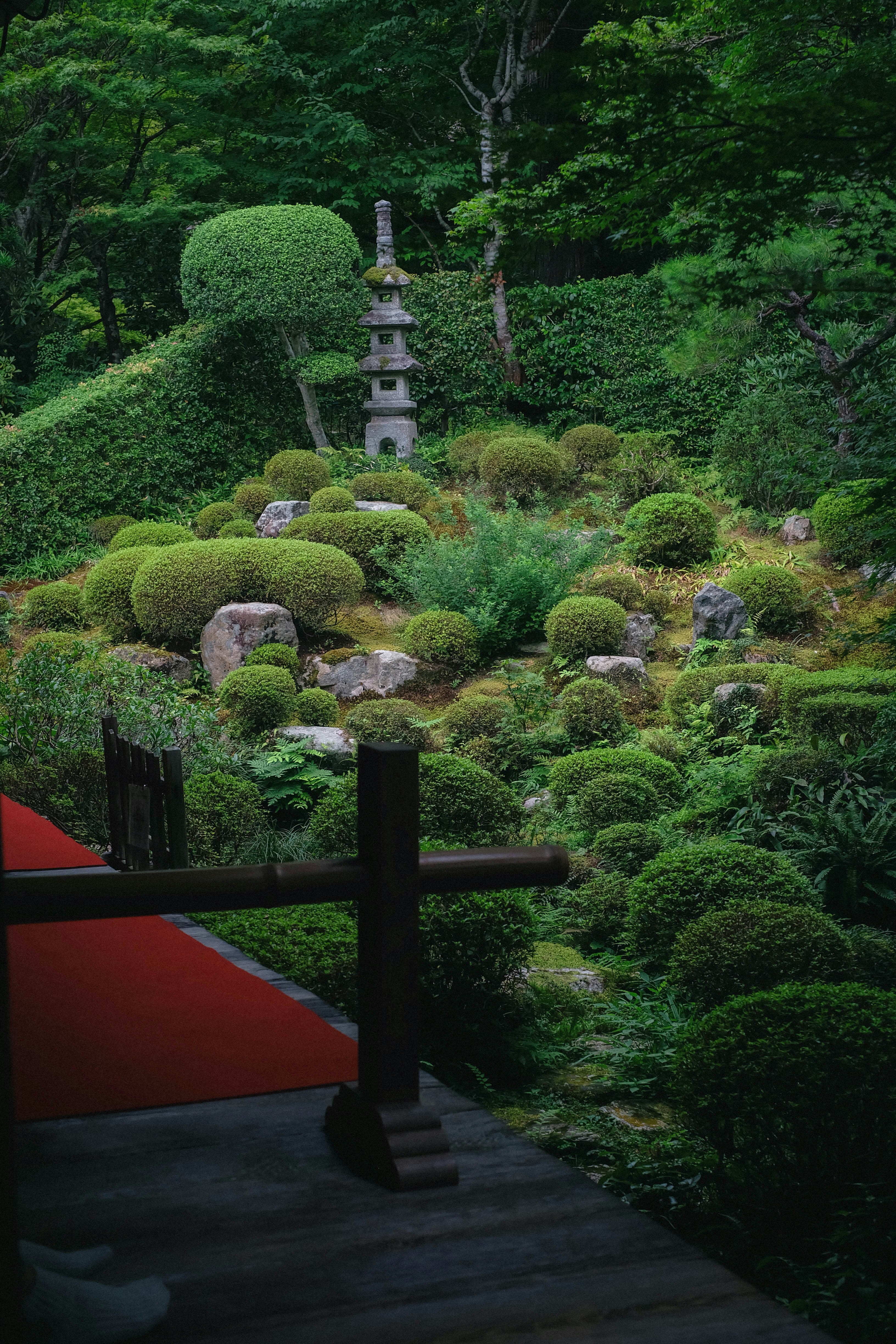 Zen Garden Lantern Amid Sculpted Foliage