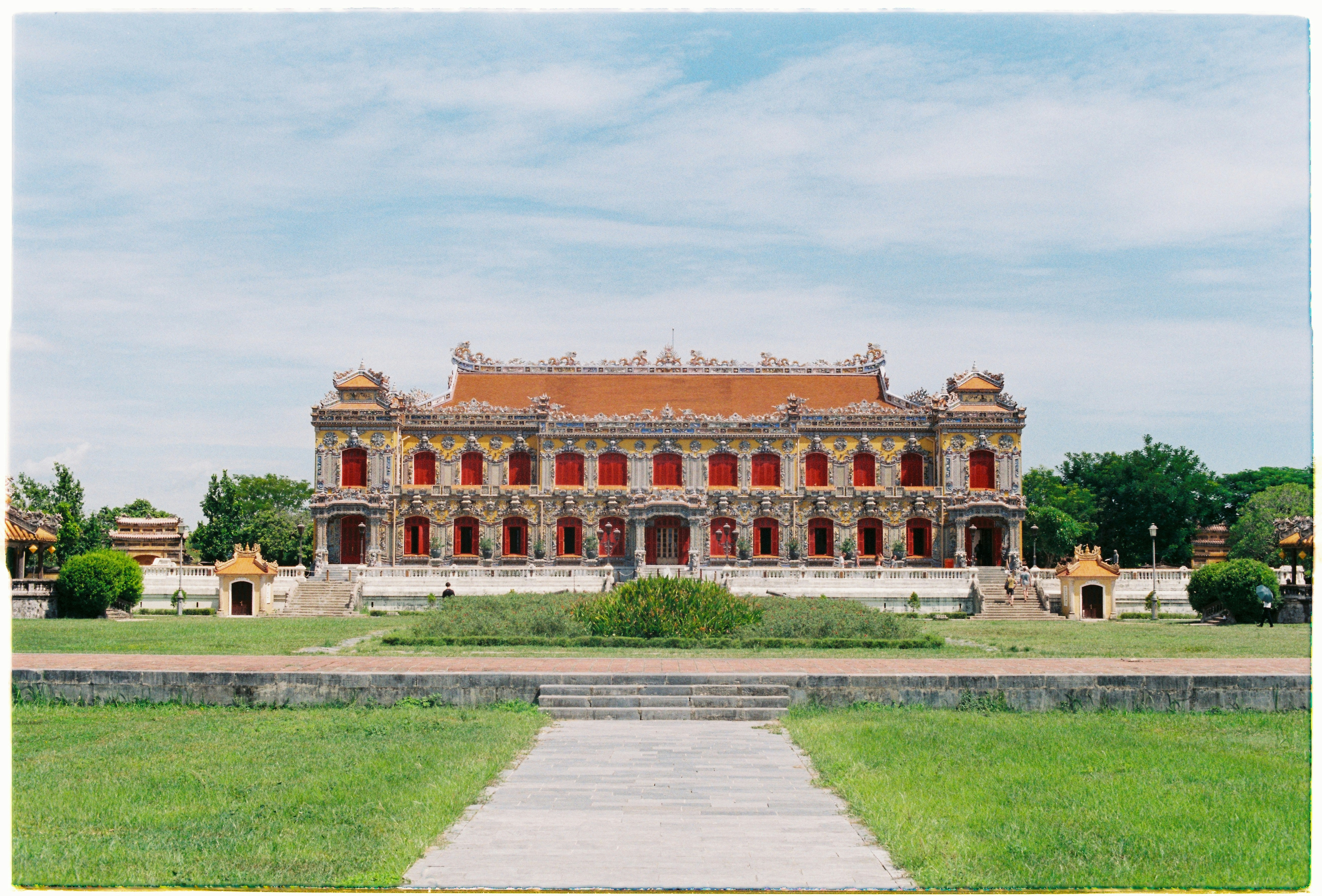 Symmetrical Vietnamese-era Pavilion Rising Above a Mancala of Lawn