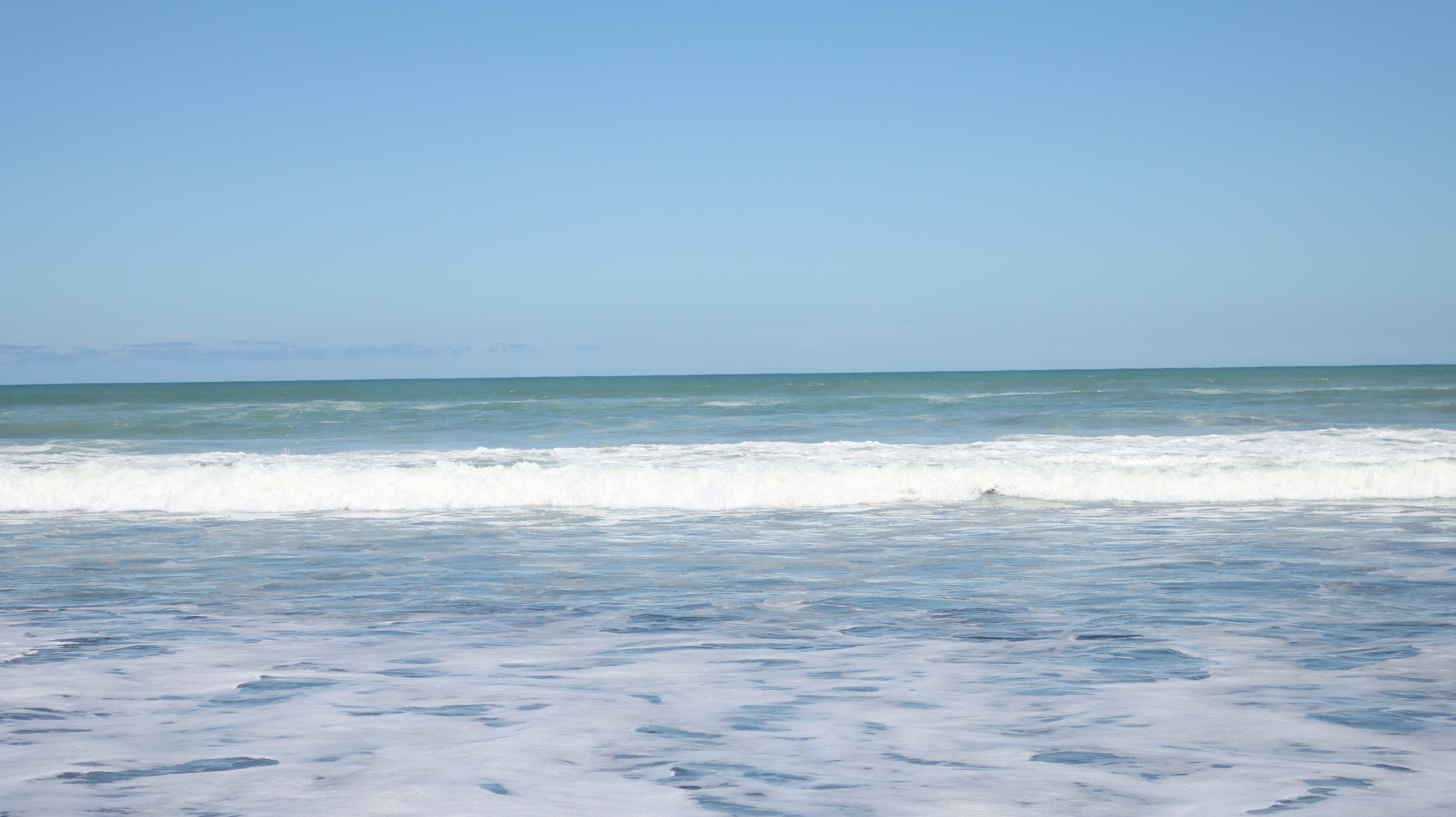 Line of Crest and Foam: A Quiet Seascape at Noon