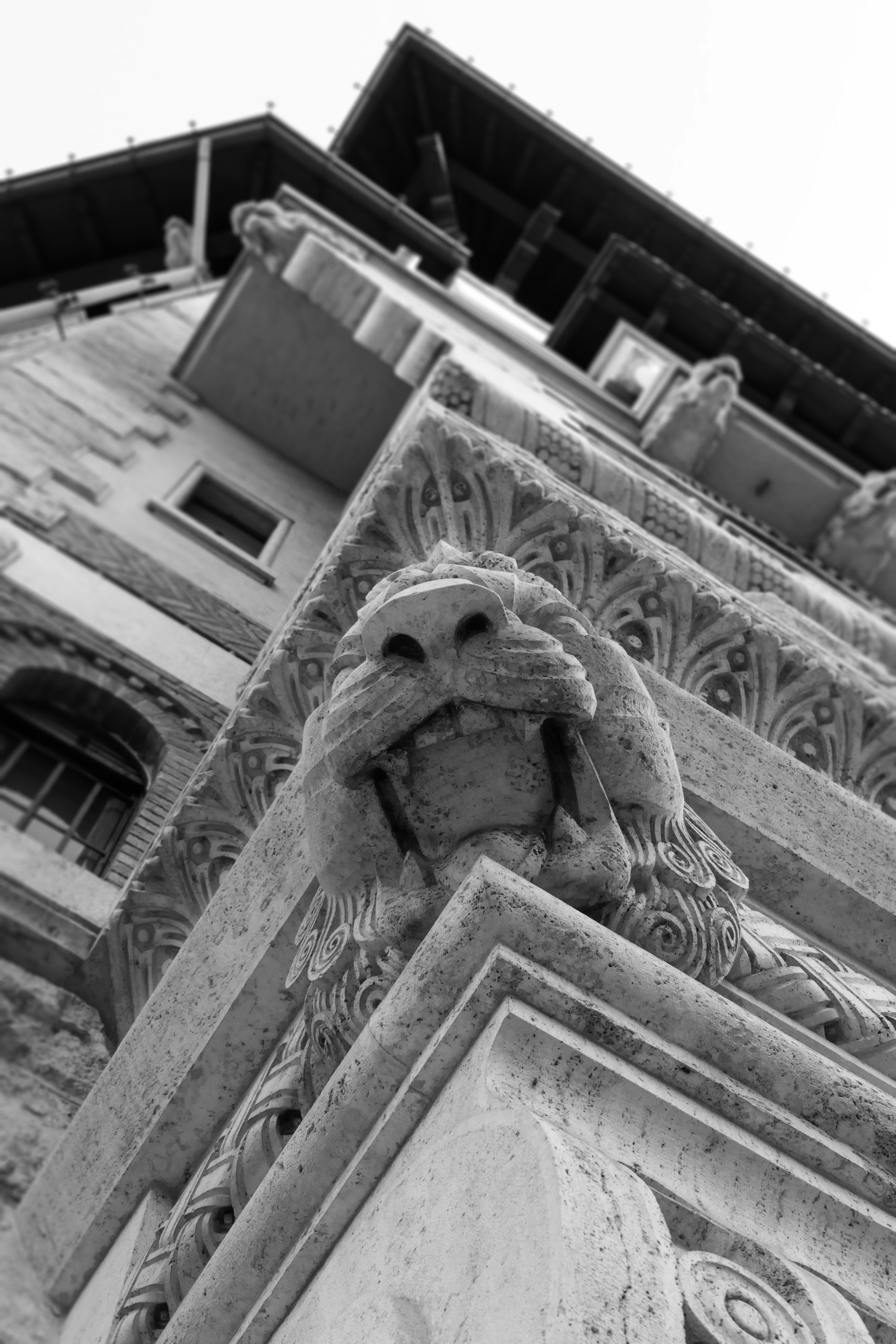 Stone Guardian Overlook: A Tilted Vista of Carved Beast and Facade