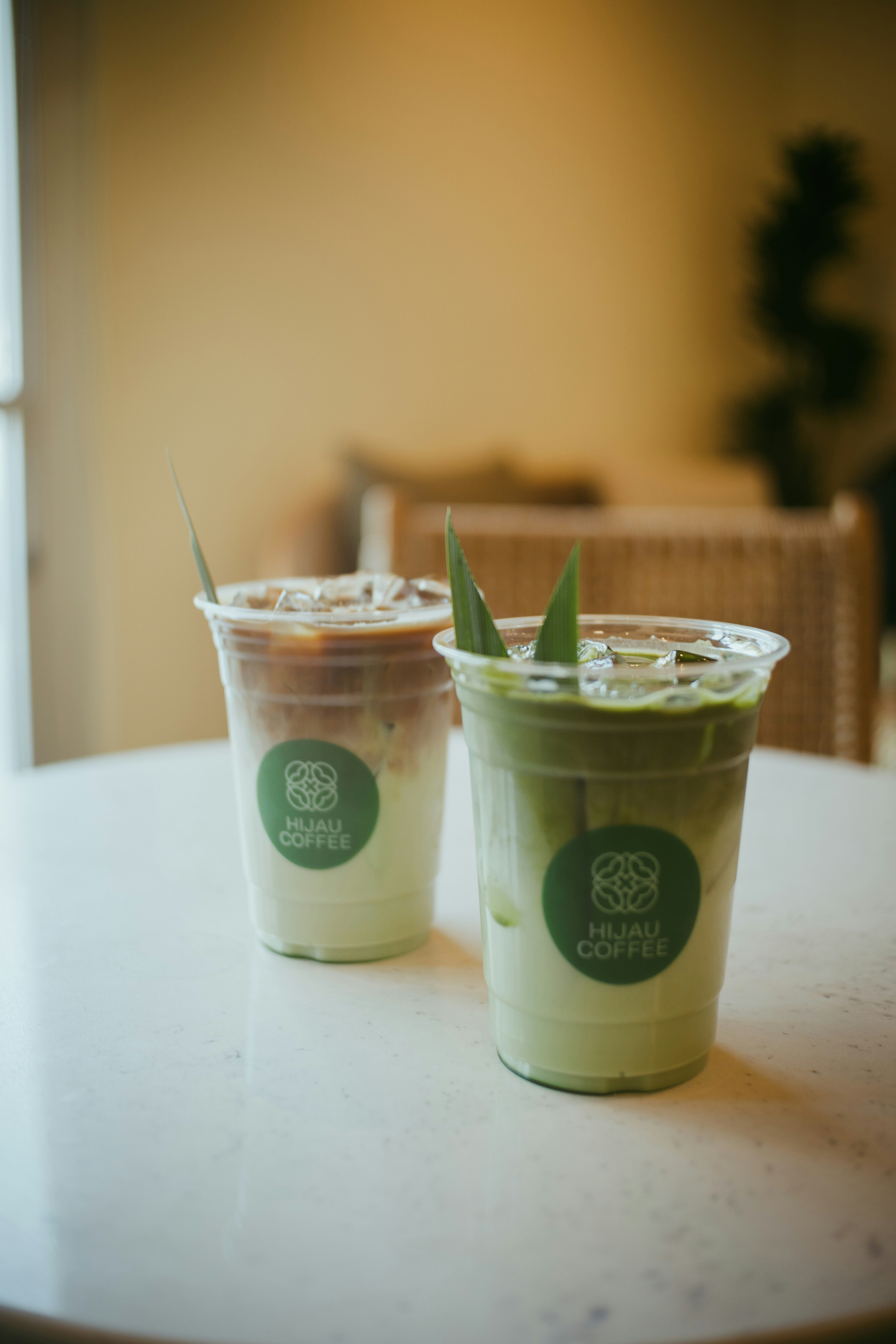 Matcha Moments: Two Iced Green Coffees On a Marble Table
