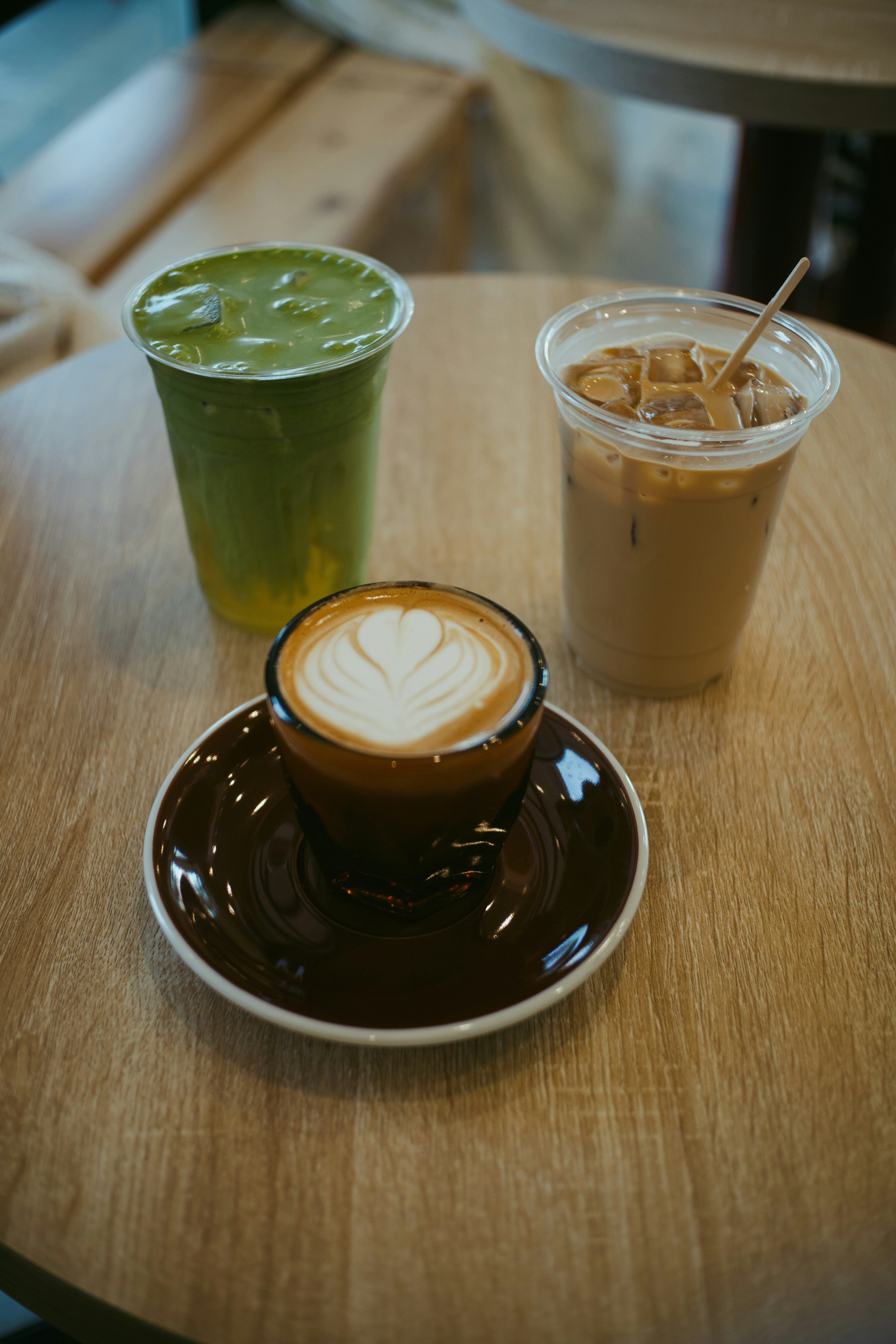 Triple Drink Pause: A Café Table Spotlight on Coffee Art