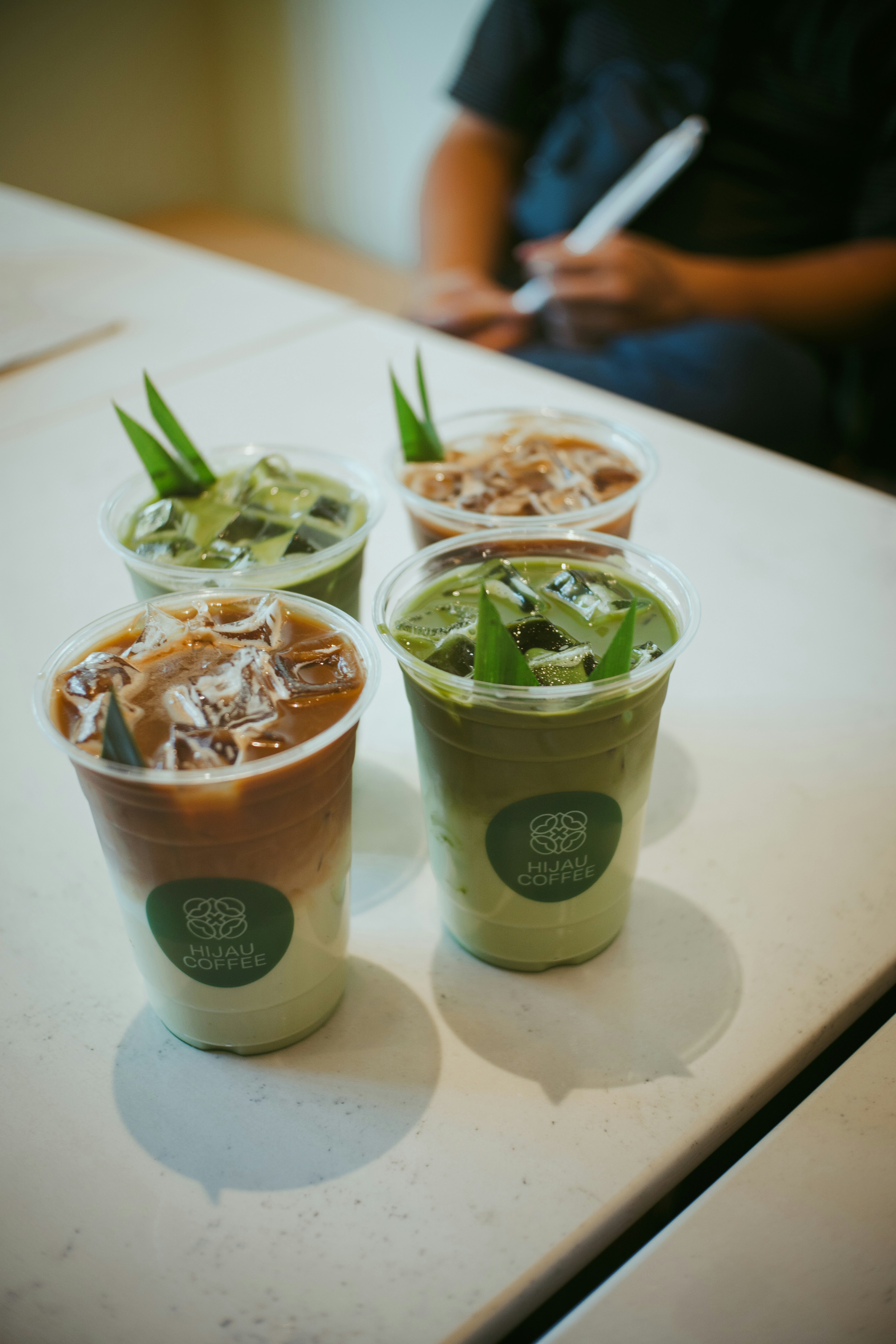 Three Matcha Treats on a Marble Counter