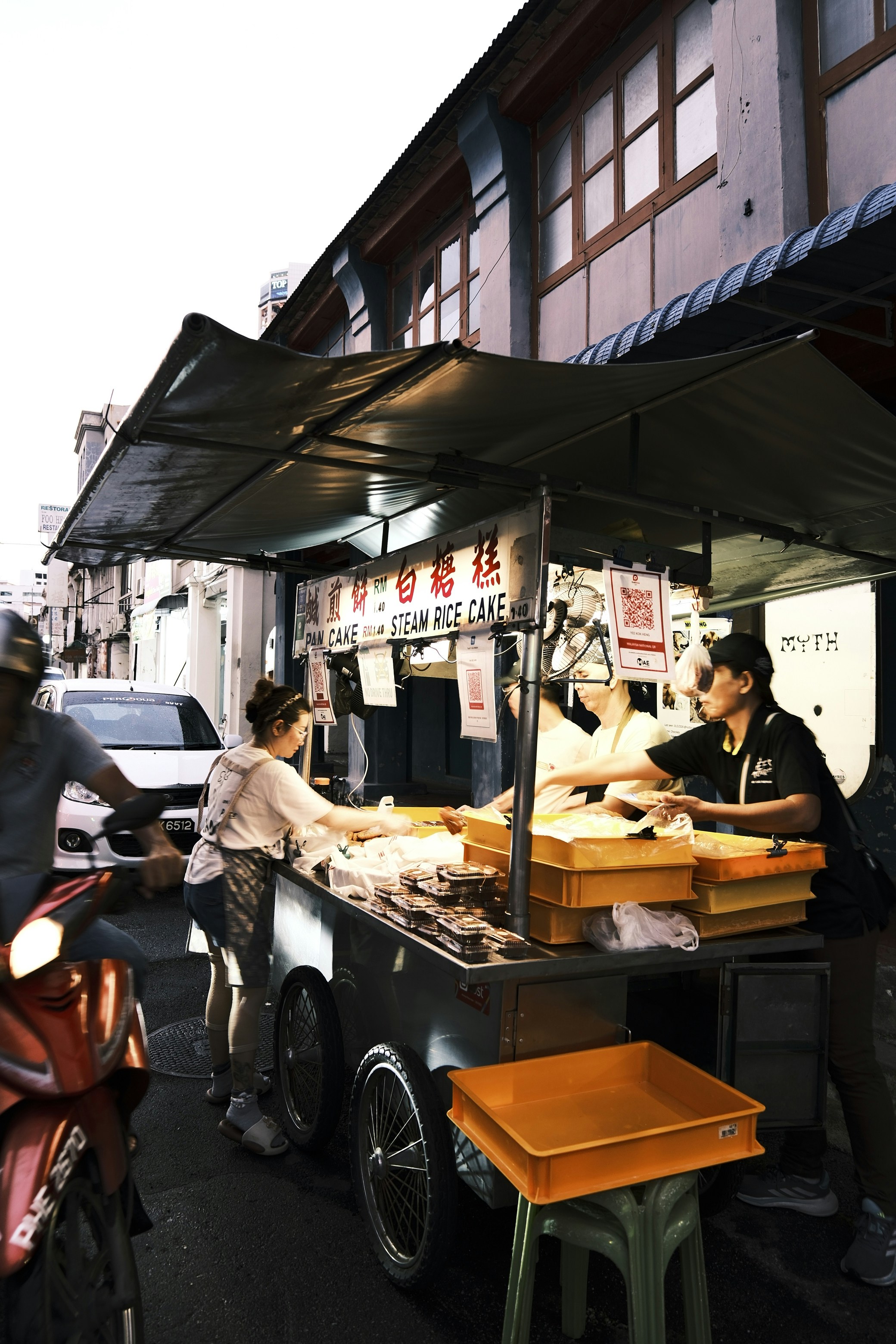 Street Cart Culinary Window: Steam, Steamers, and Hands