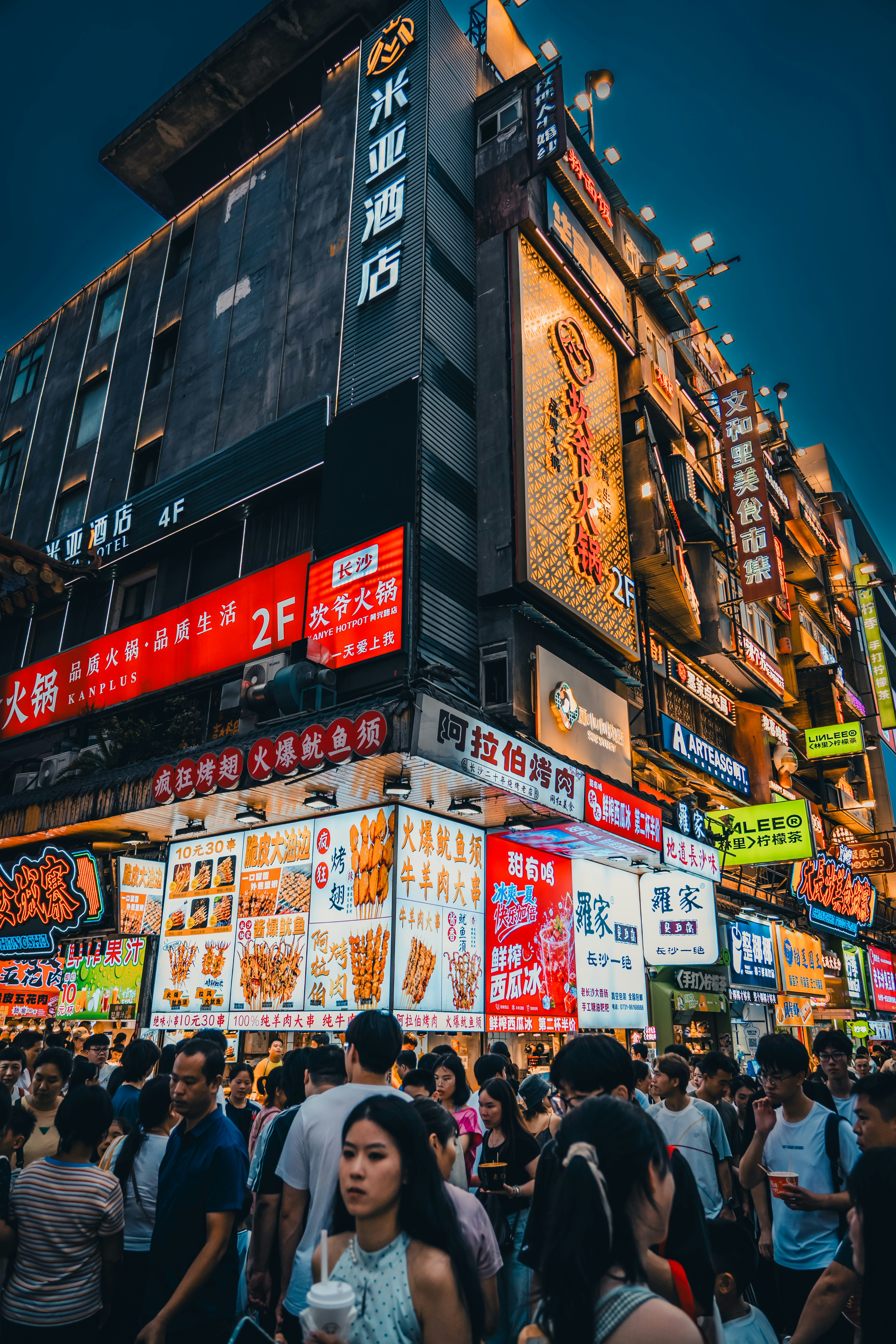Neon Pulse on a Crowded Tokyo-like Night Street