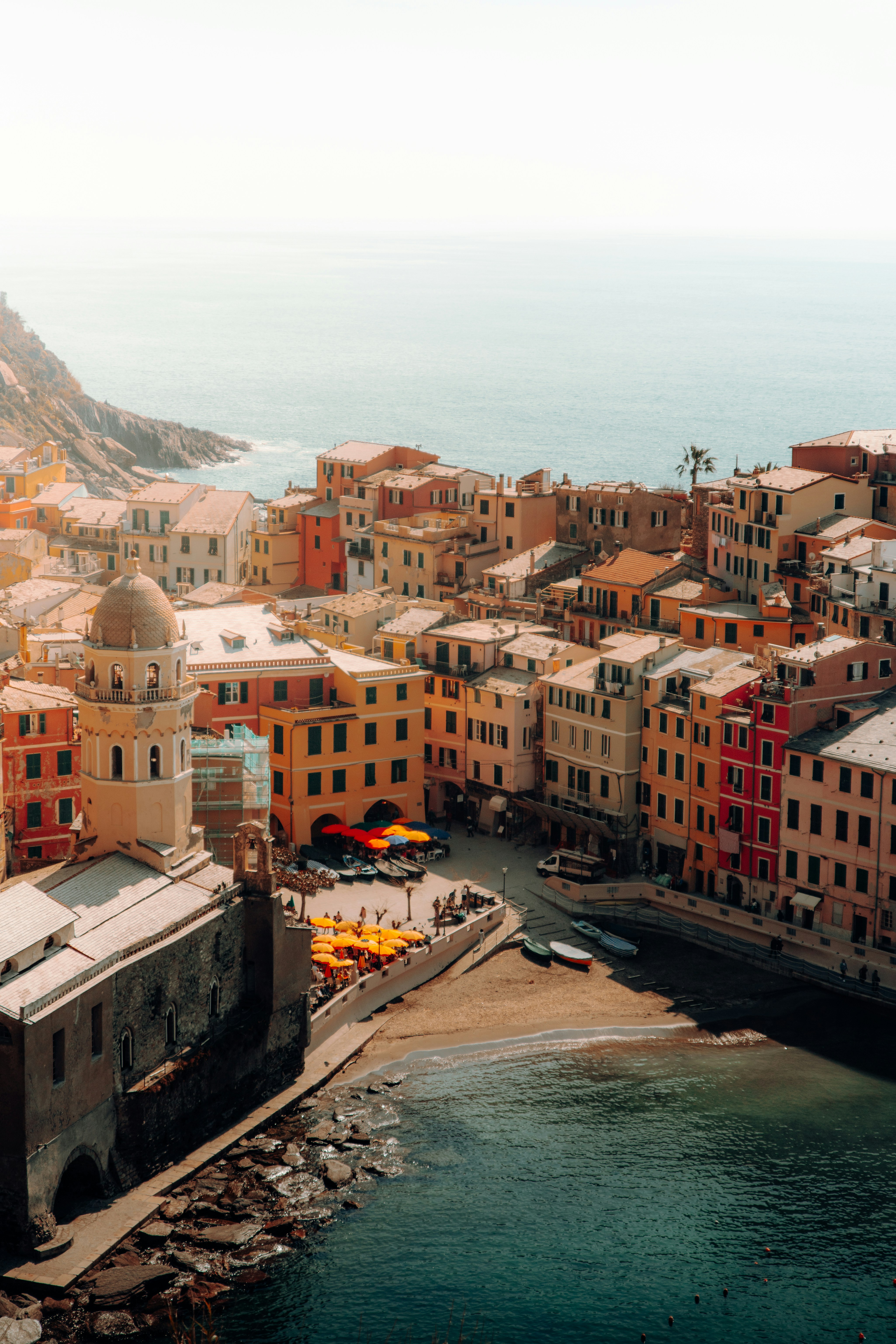 Pastel Harbor: A Coastal Village Nestled by Golden Hills
