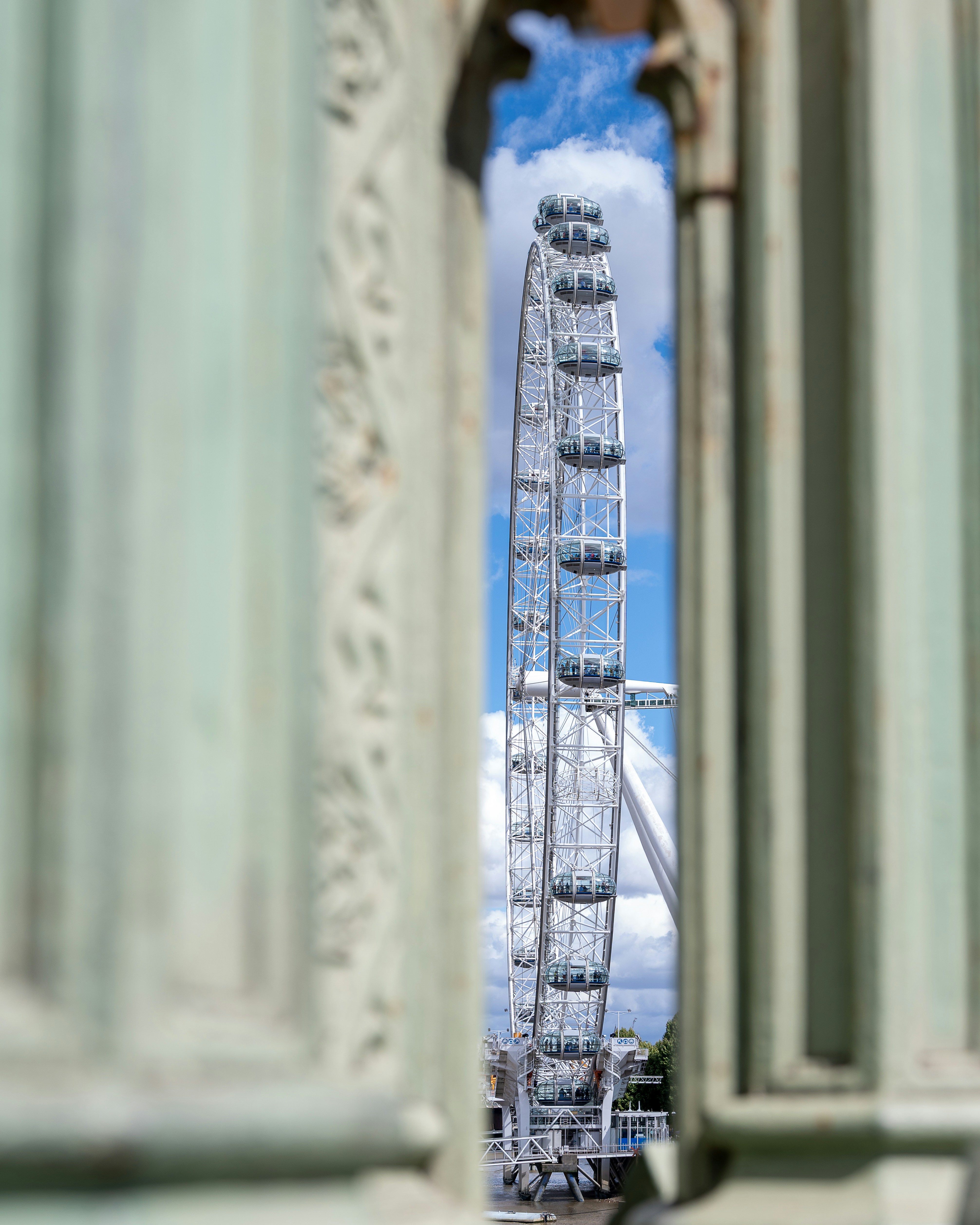 Through a Narrow Frame: The London Eye Framed by Architectural Columns