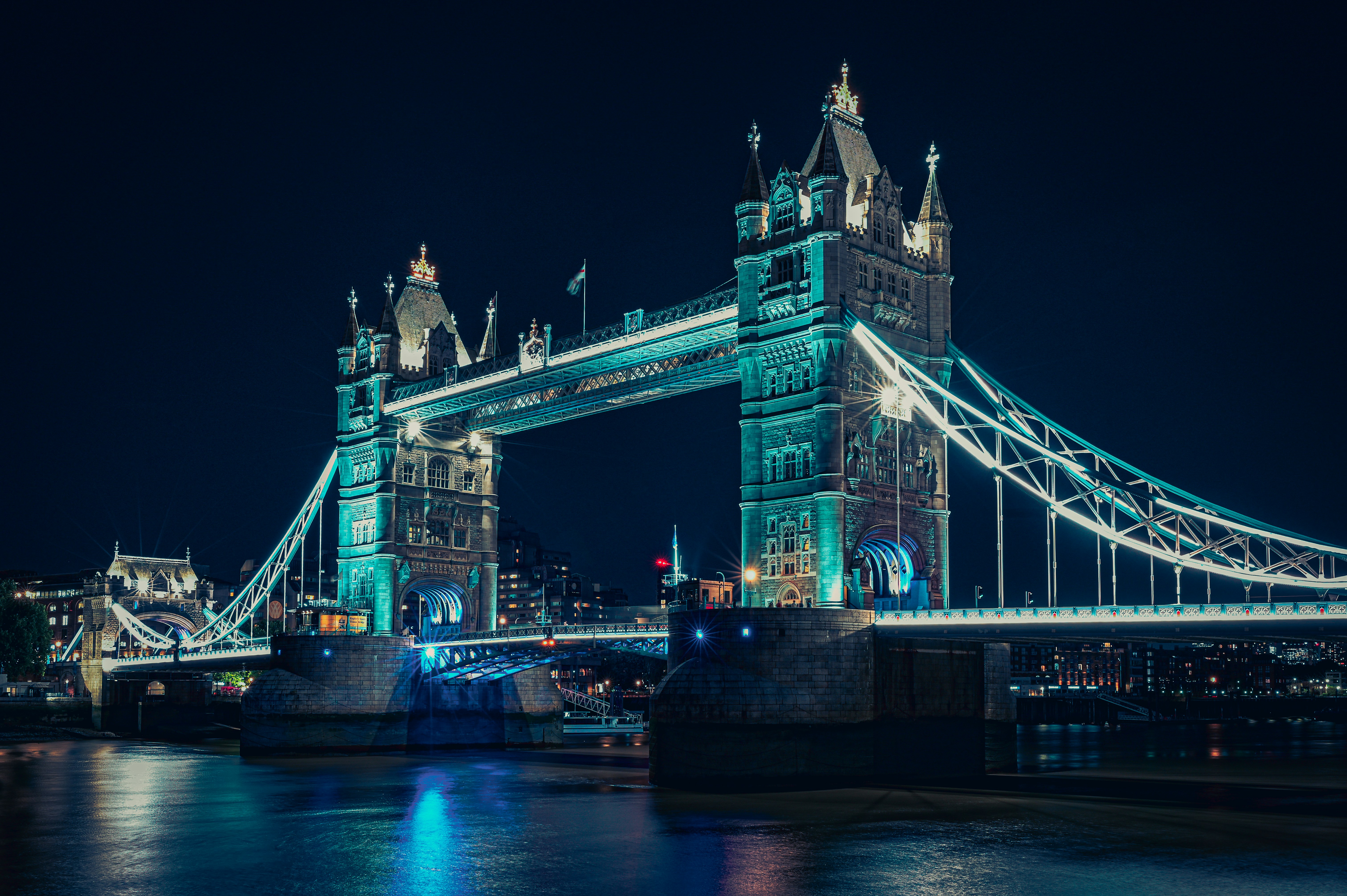 Tower Bridge at Dusk: Illuminated Spires Over a Quiet Thames