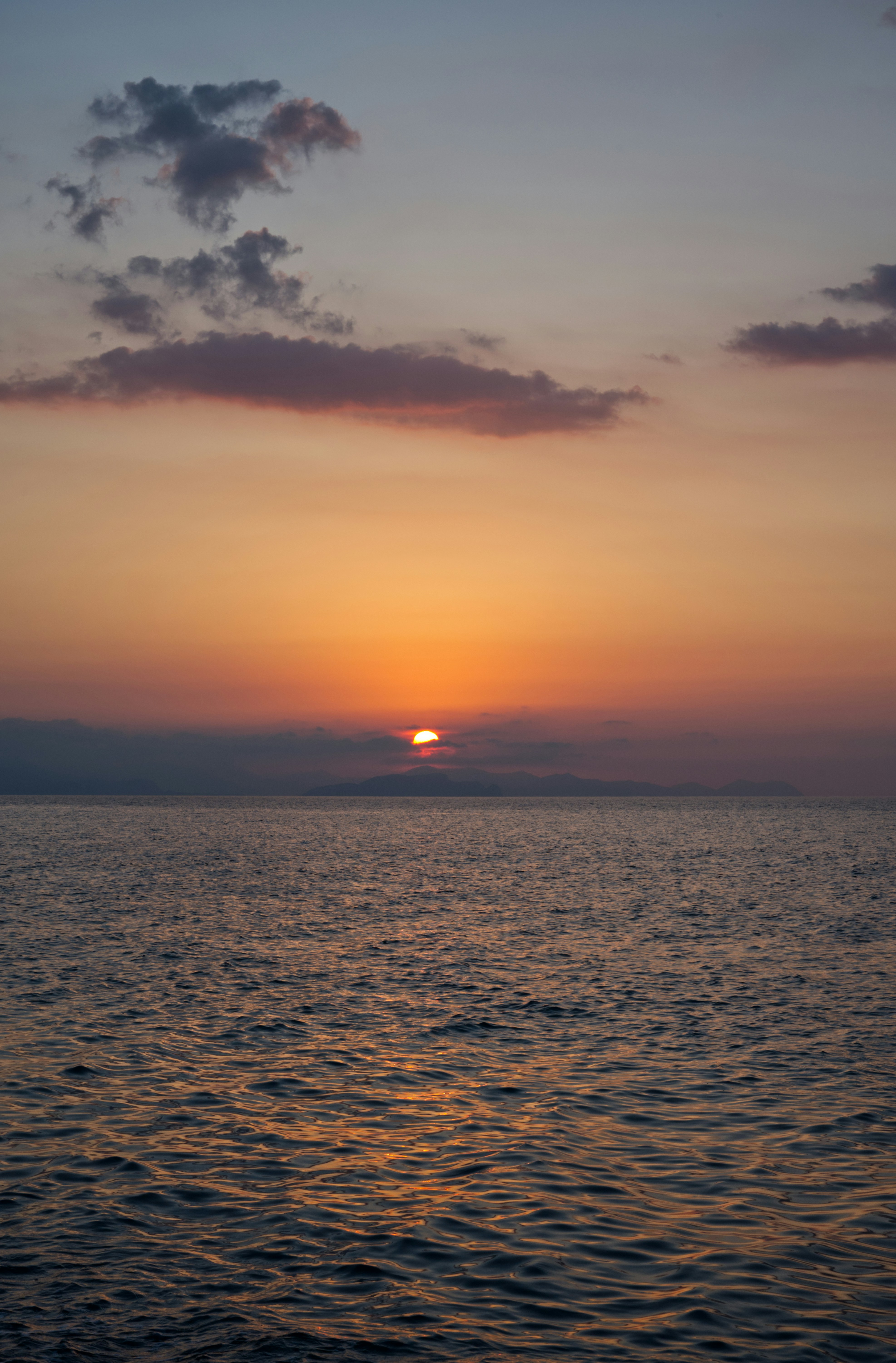 Sun Dip Over a Glowing Sea