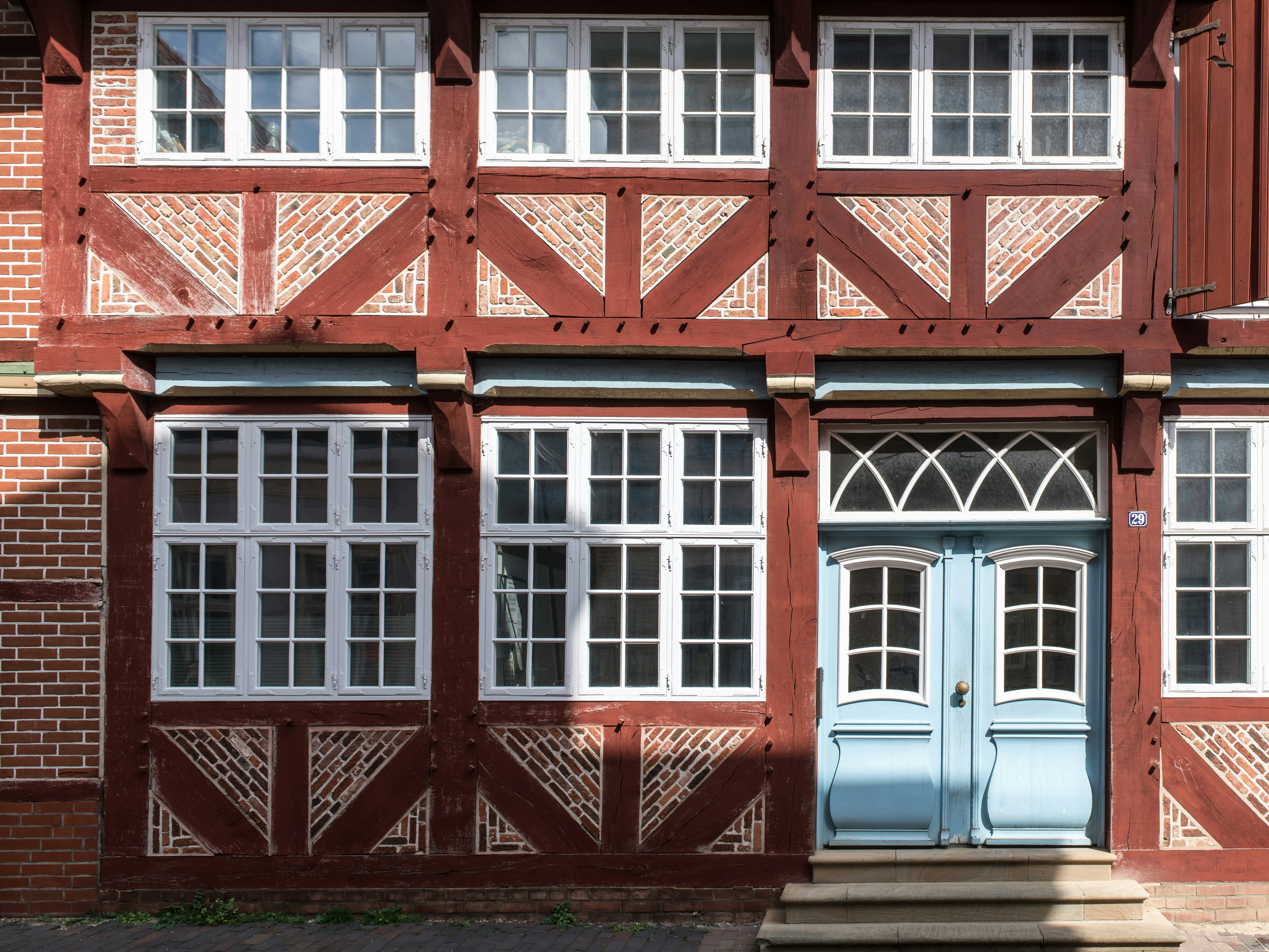 Blue Door at the Timber-Tall Facade