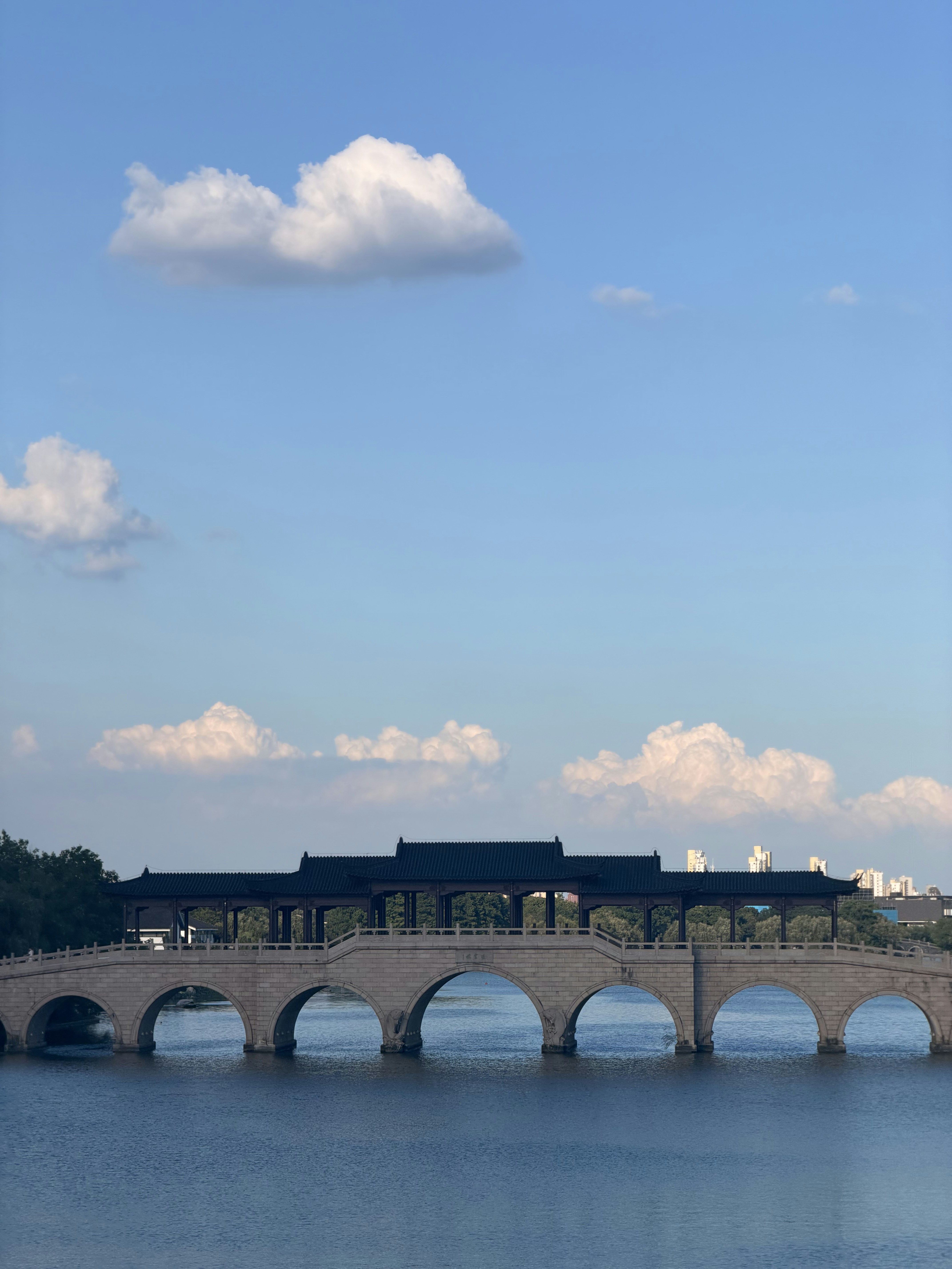 Bridge of Arches Echoes Over Quiet Waters