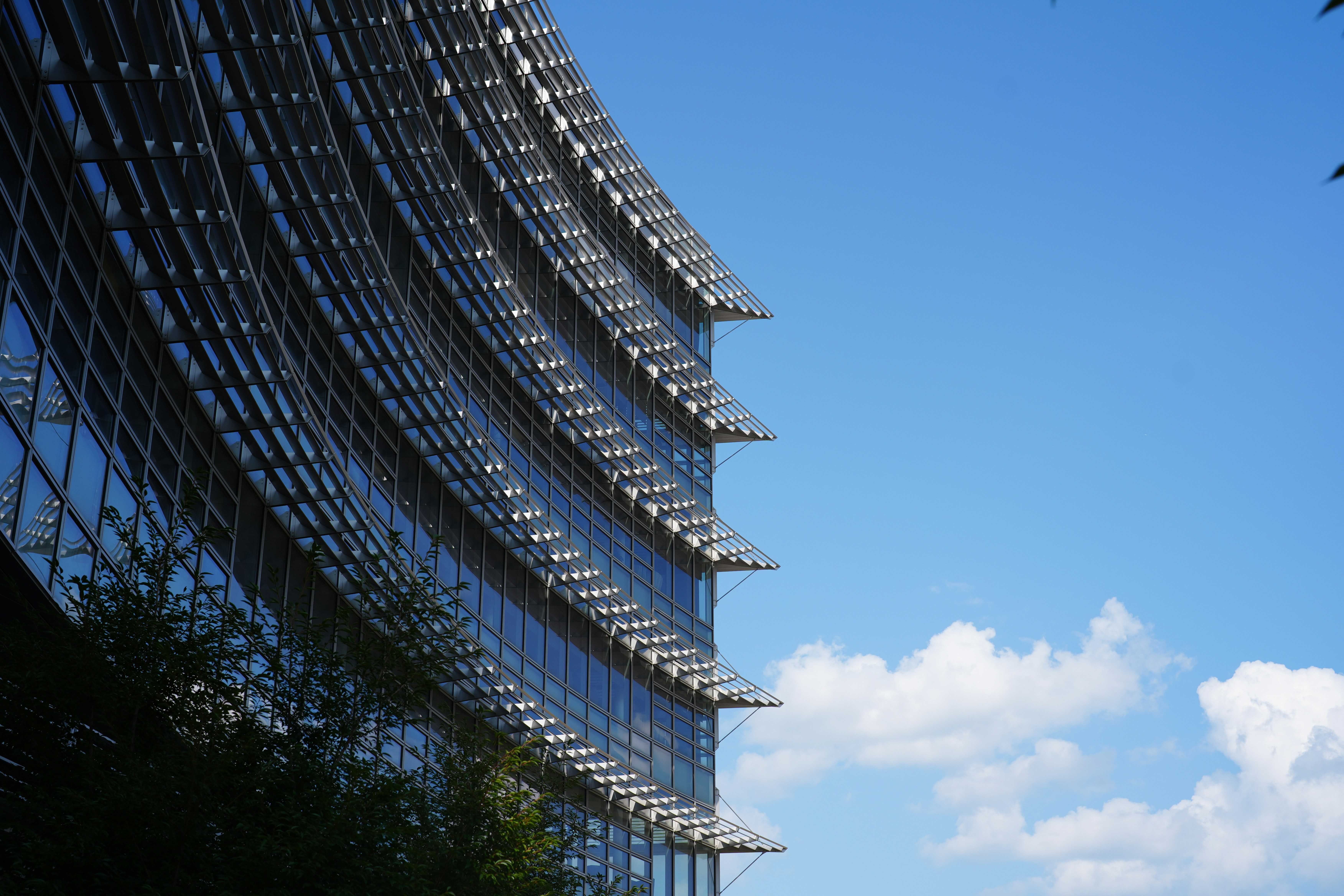 Curved Facade Rhythm Against a Clear Sky