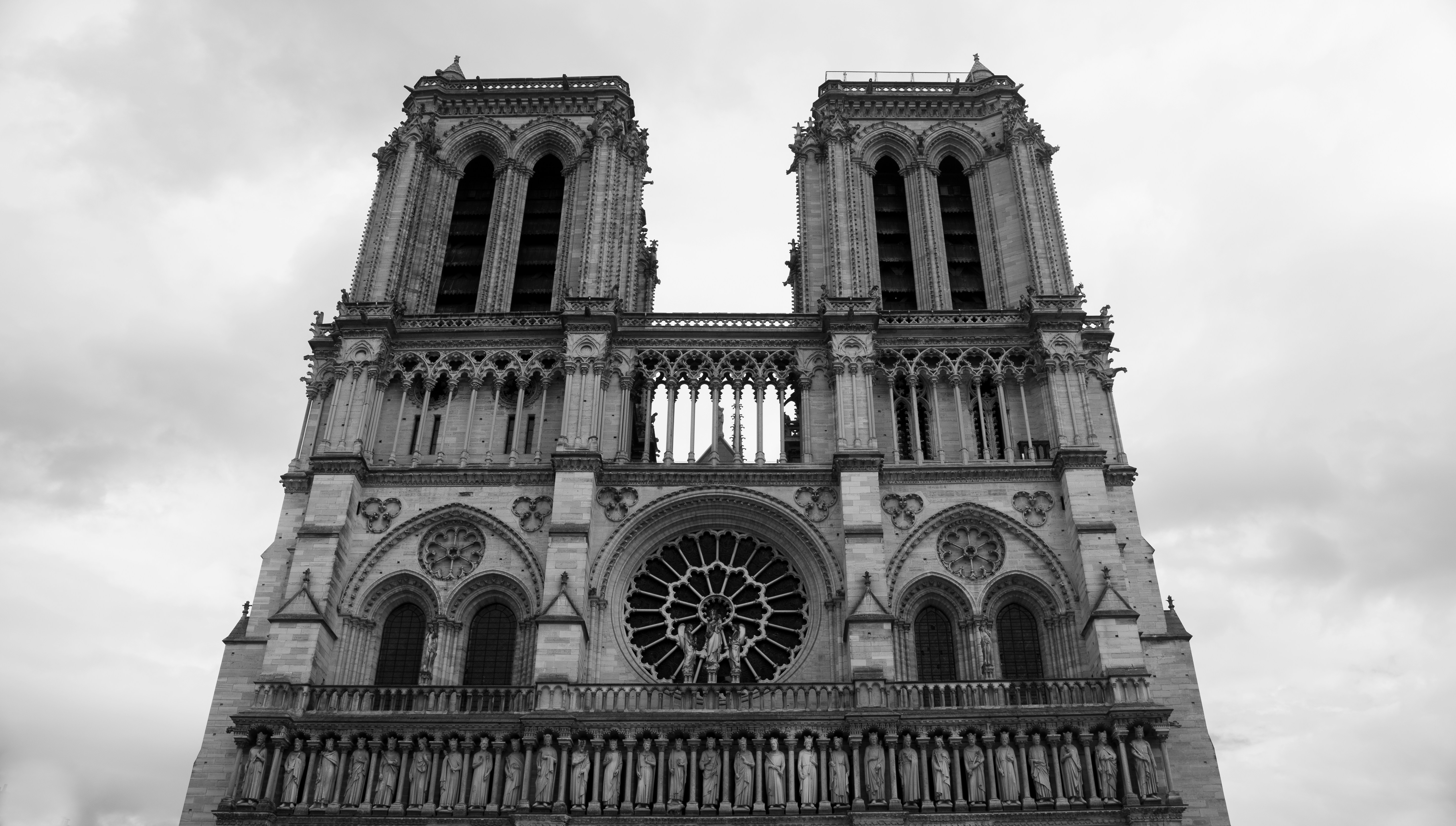 Gothic Facade in Monochrome: Notre Dame’s Twin Towers Confront the Sky