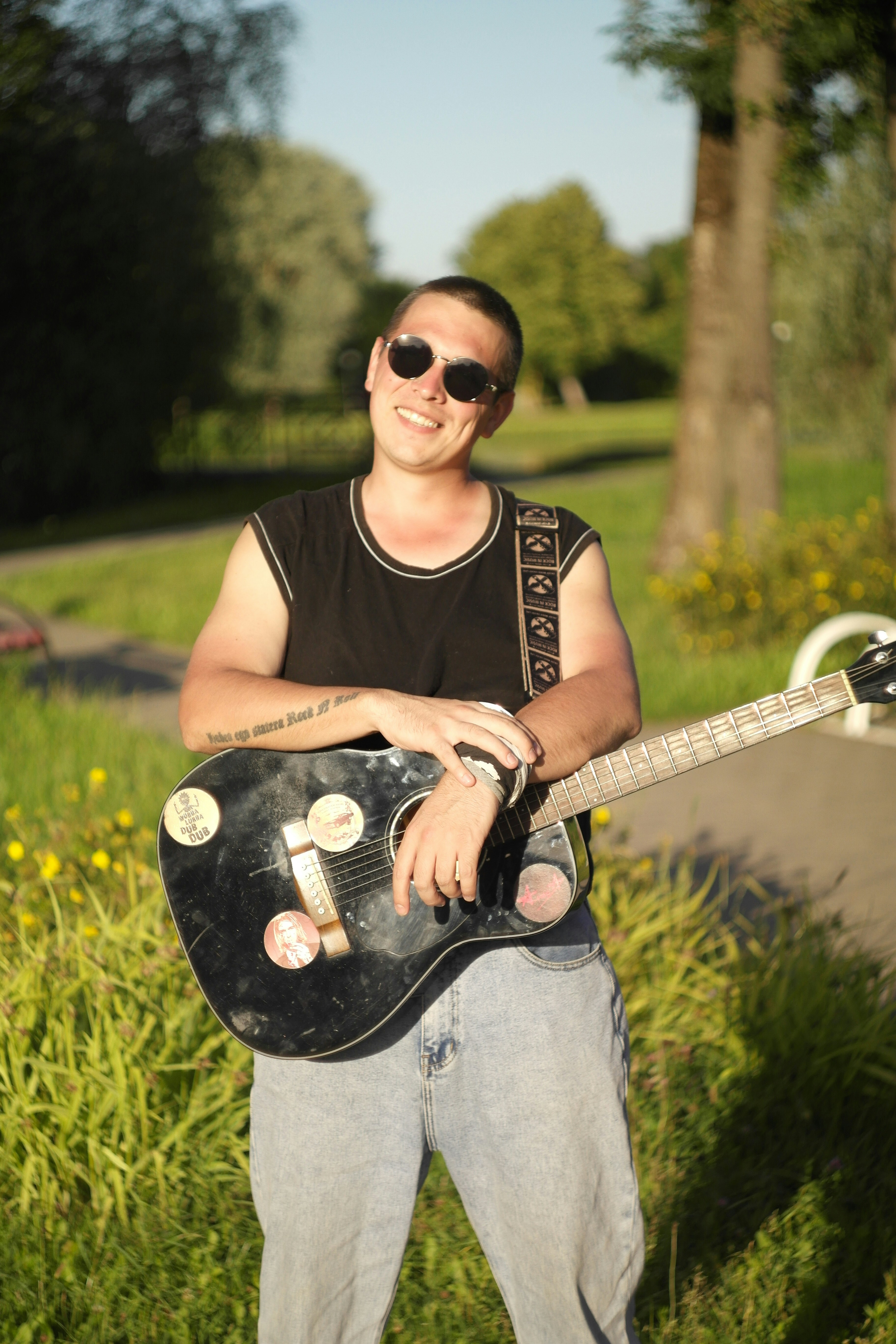 Guitarist in Sunlit Park