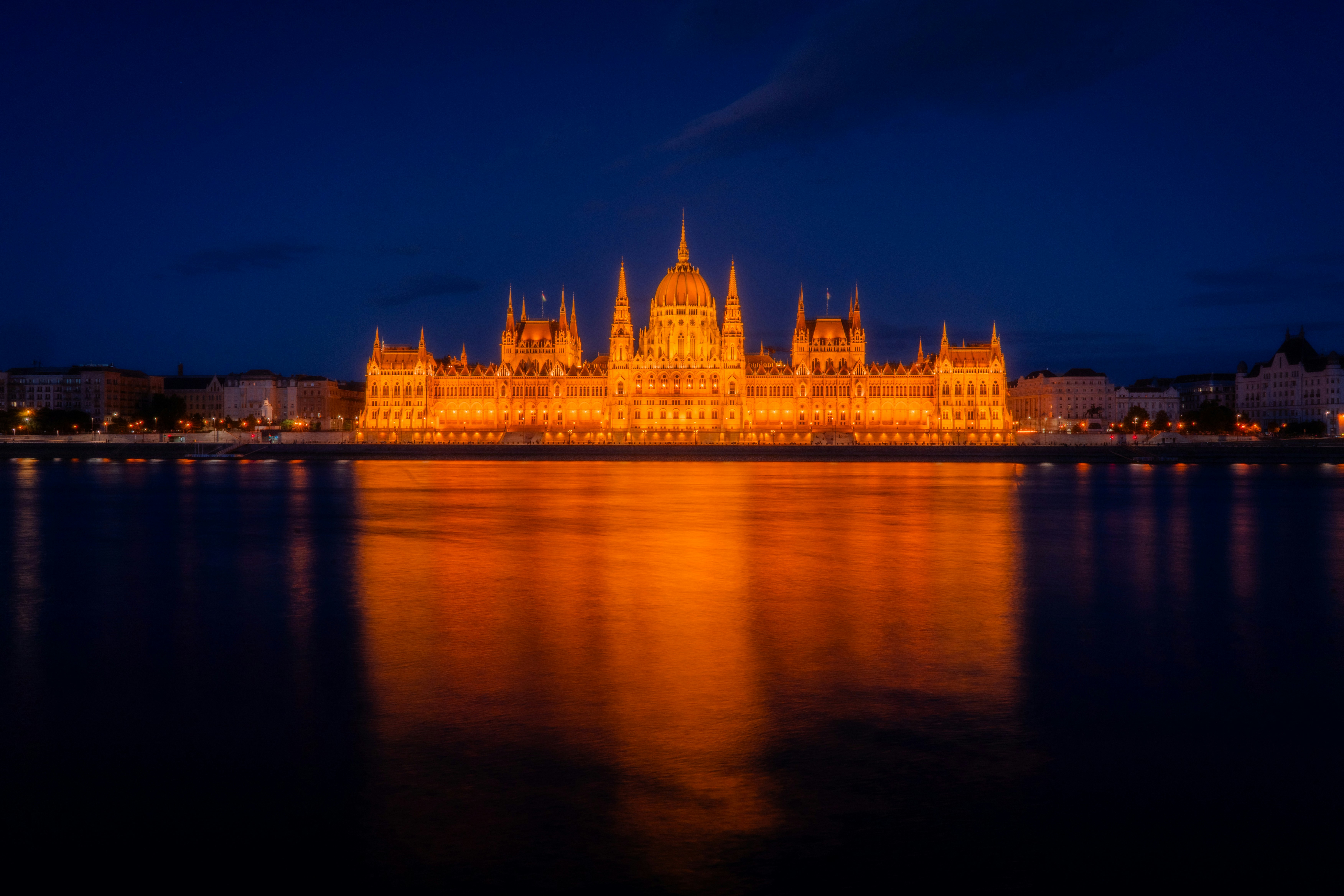 Golden Basilica by the Danube: Night Illumination Across the Water