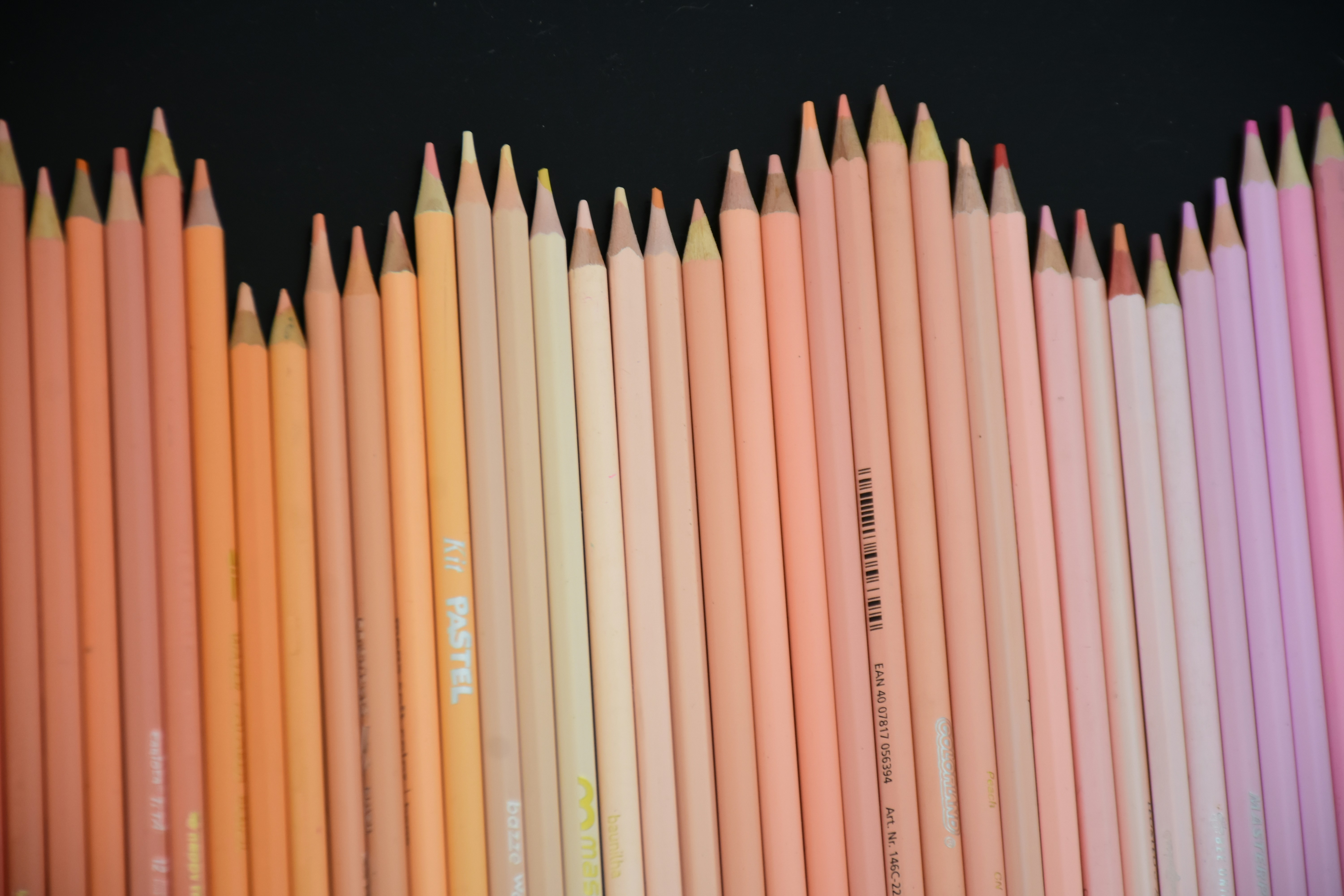 Rainbow Array: A Horizon of Colored Pencils Resting in Quiet Alignment