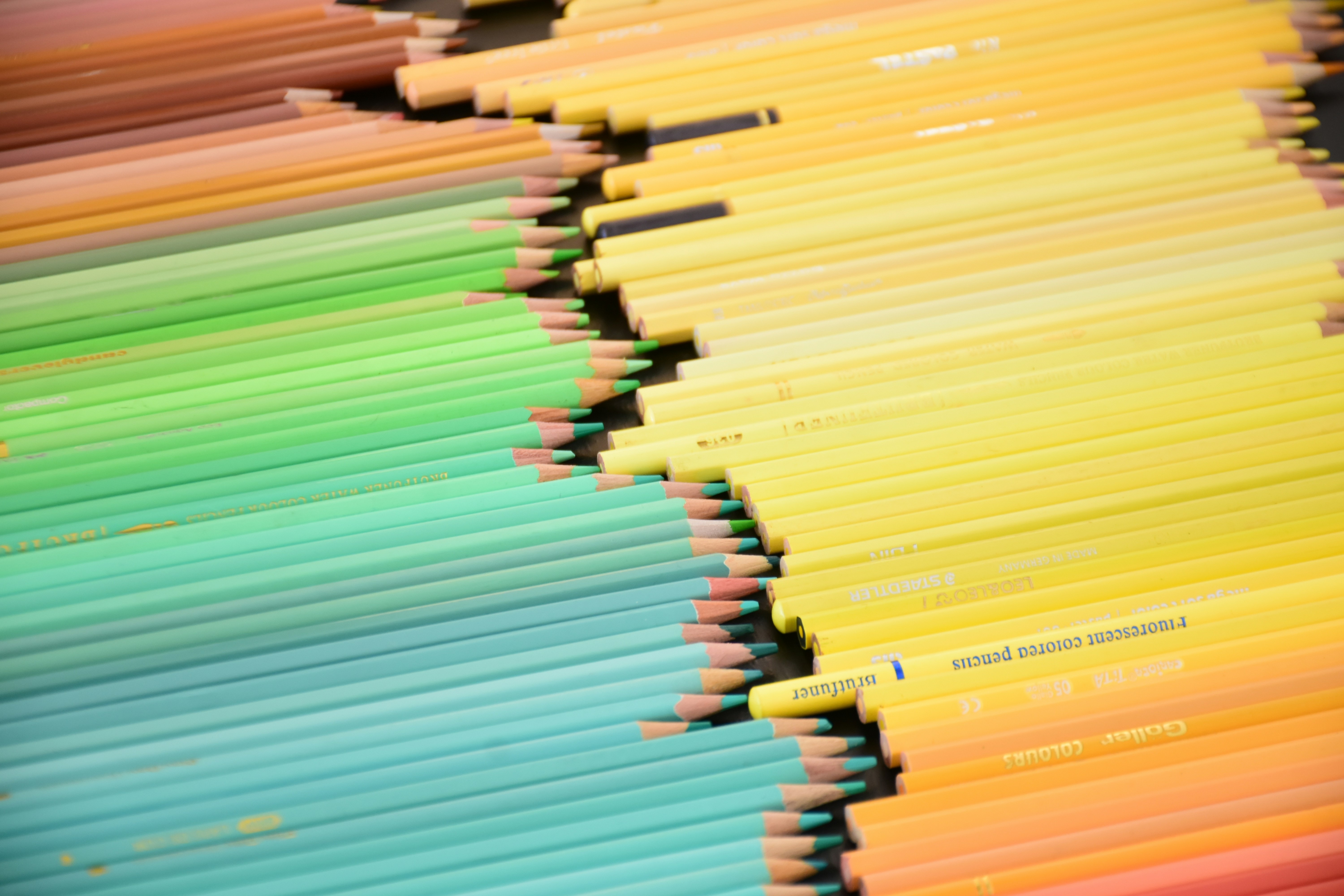Chromatic Pencil Rush: Sunset Hues of Colored Pencils