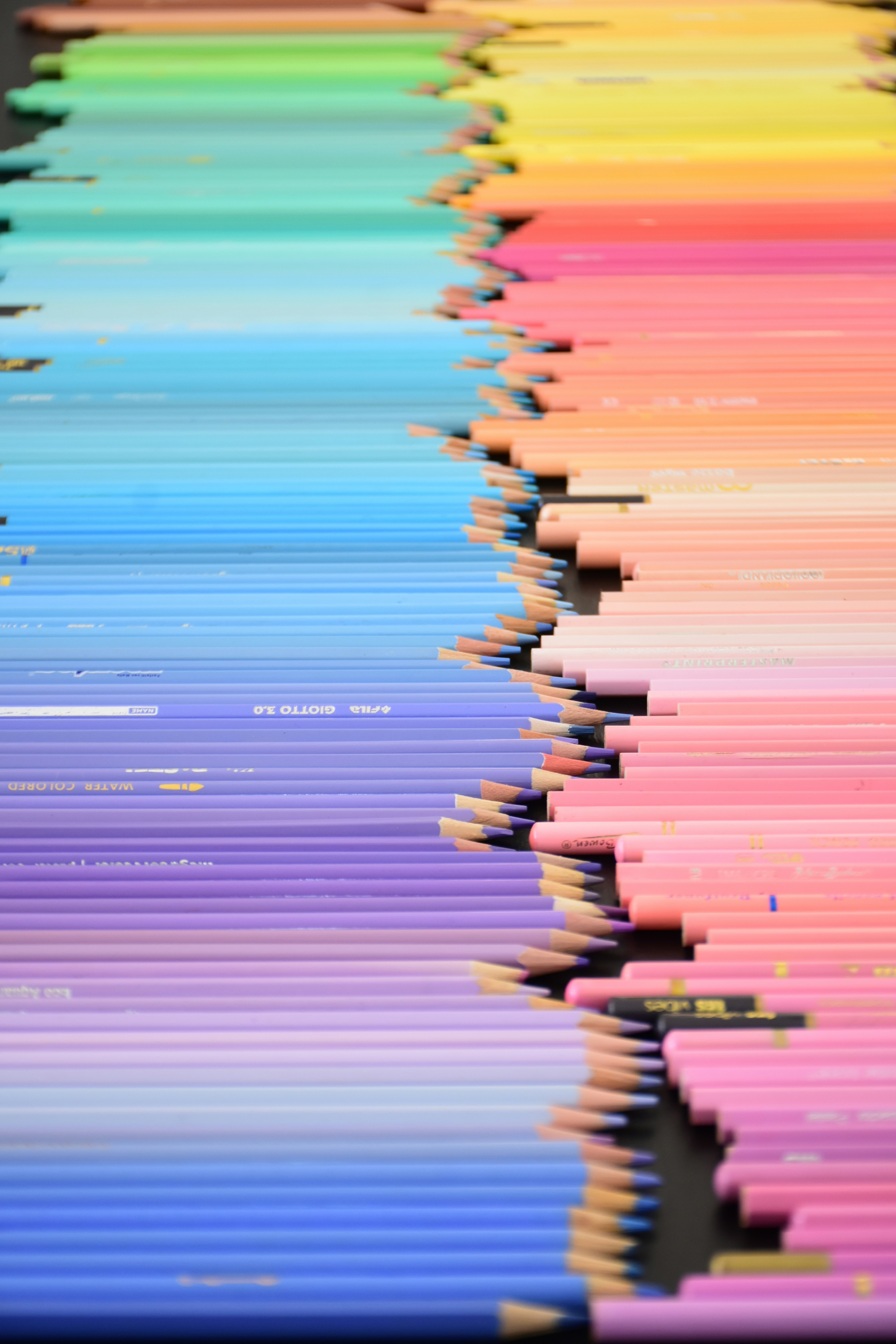 Ribboned Spectrum: a Vertical Sweep of Colorful Pencil Slats