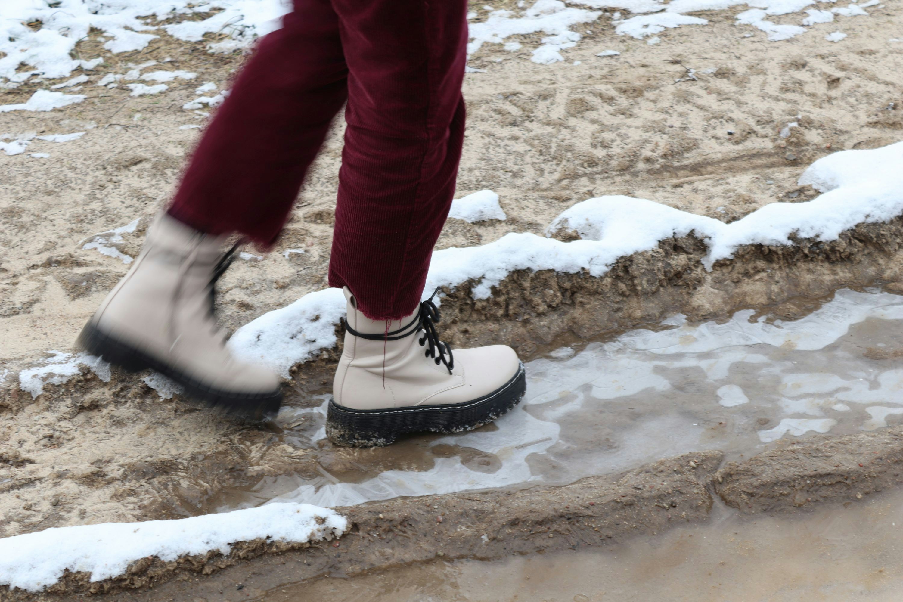 Boots in Slush: A Winter Walk Across Melting Ground