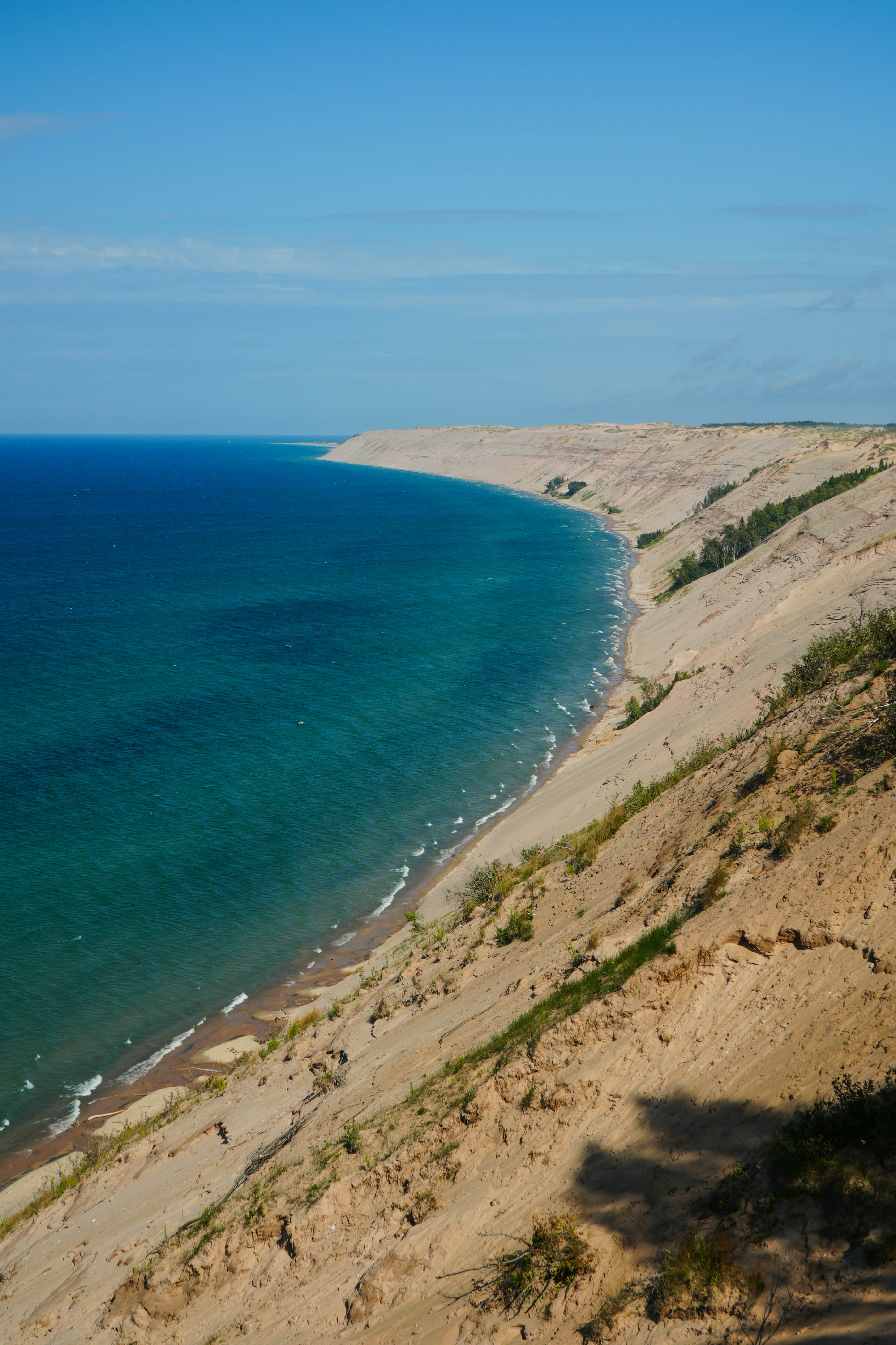 Cliffside Horizon: A Quiet Sea Along Soaring Canyon
