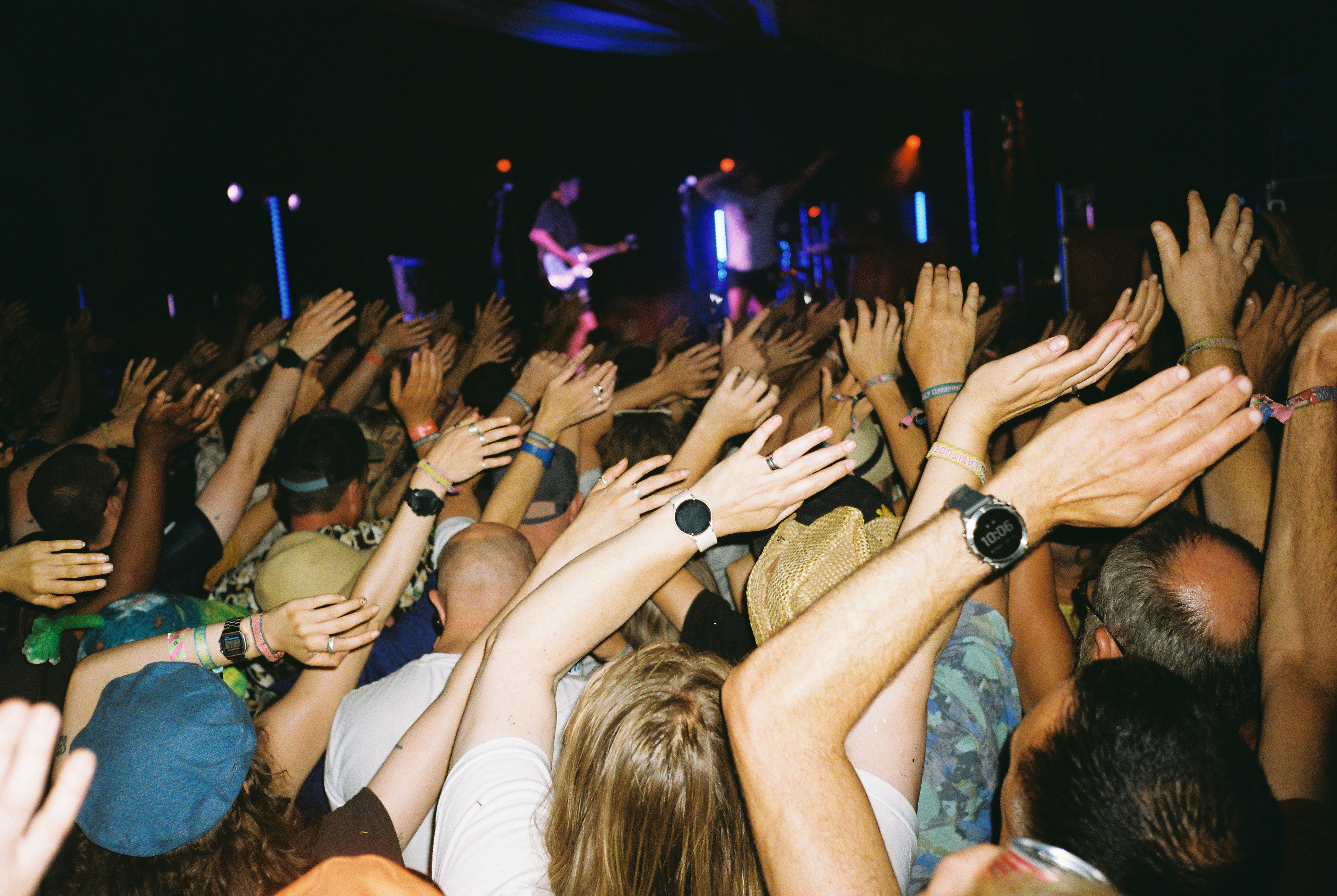 Hands in the Air at a Packed Club Show