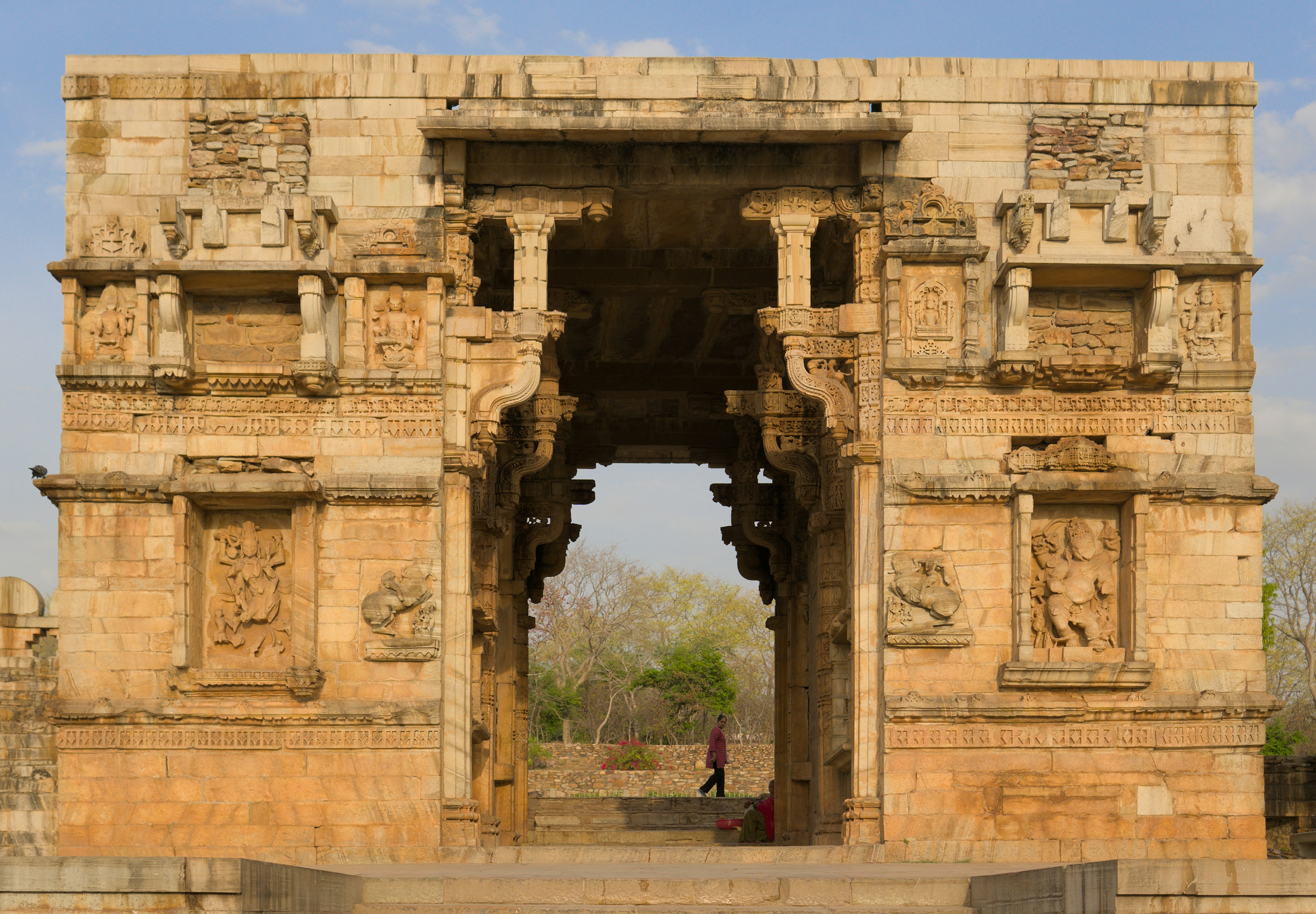 Stone Gate of Time: An Arch Framed by Subtle Distant Figures