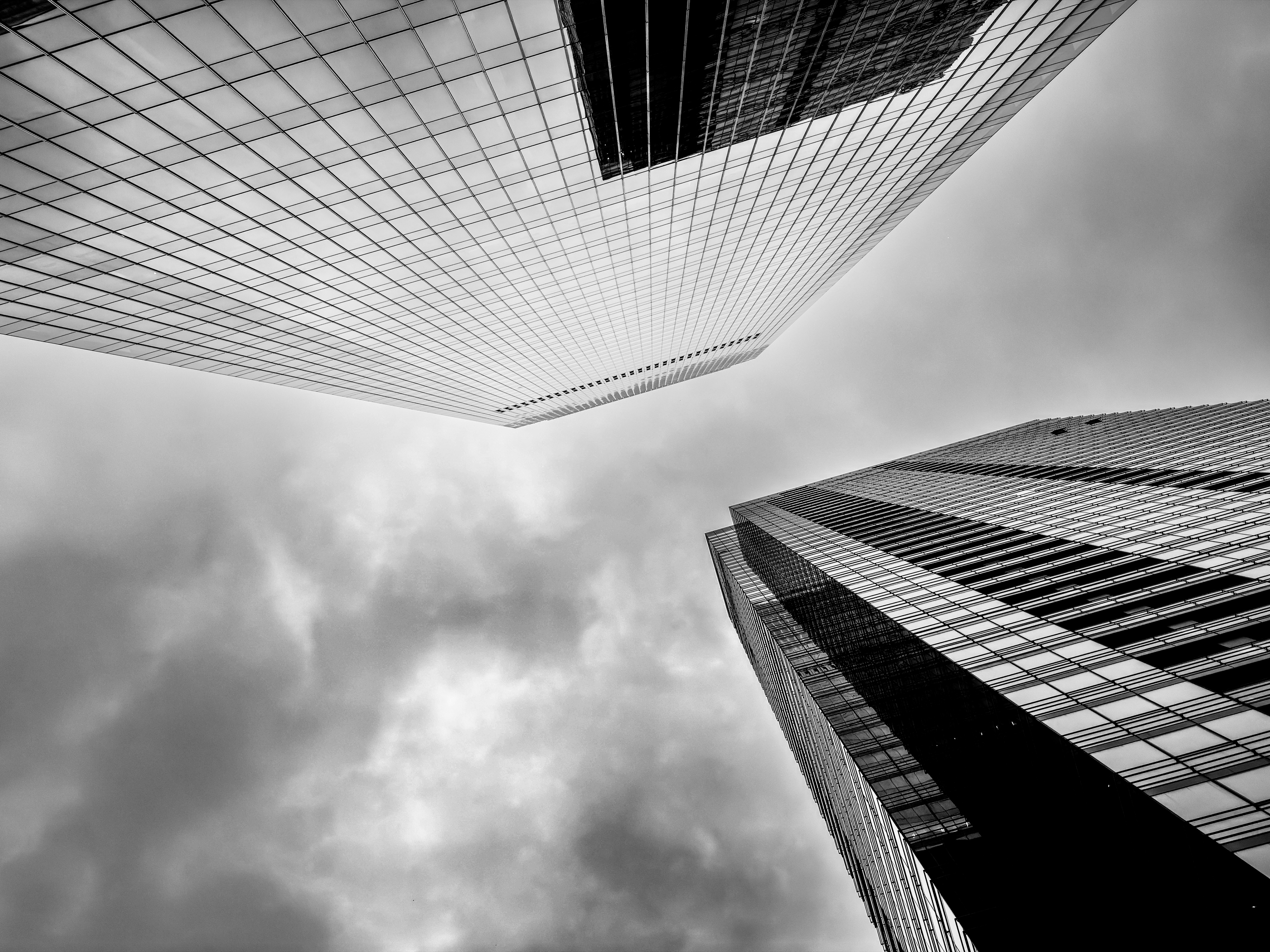 Monoliths Overcast: A Vertical Glimpse Between Skyscrapers