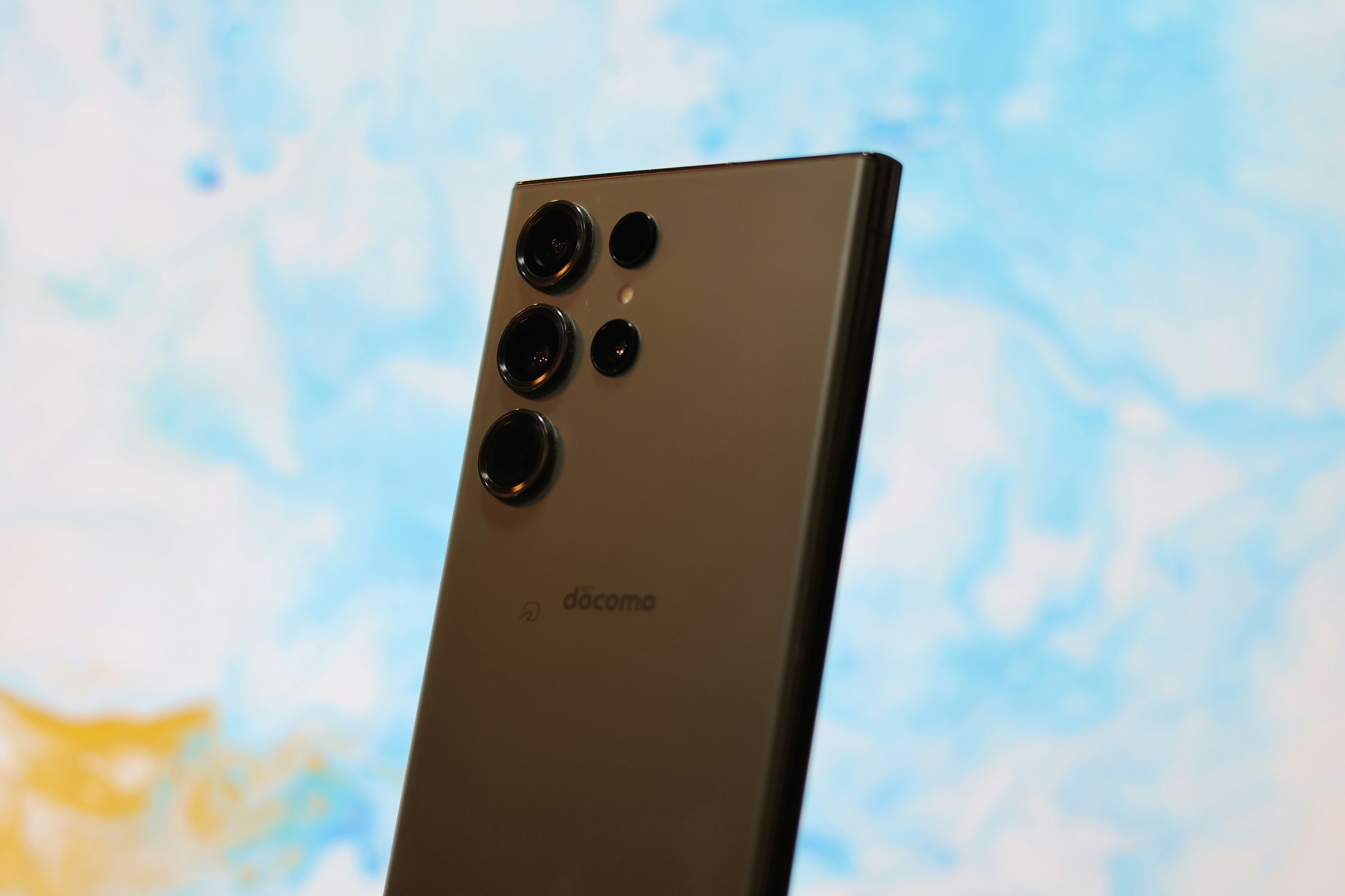 Lens Array Ascend: A Midnight Matte Back of a Multi-Camera Smartphone
