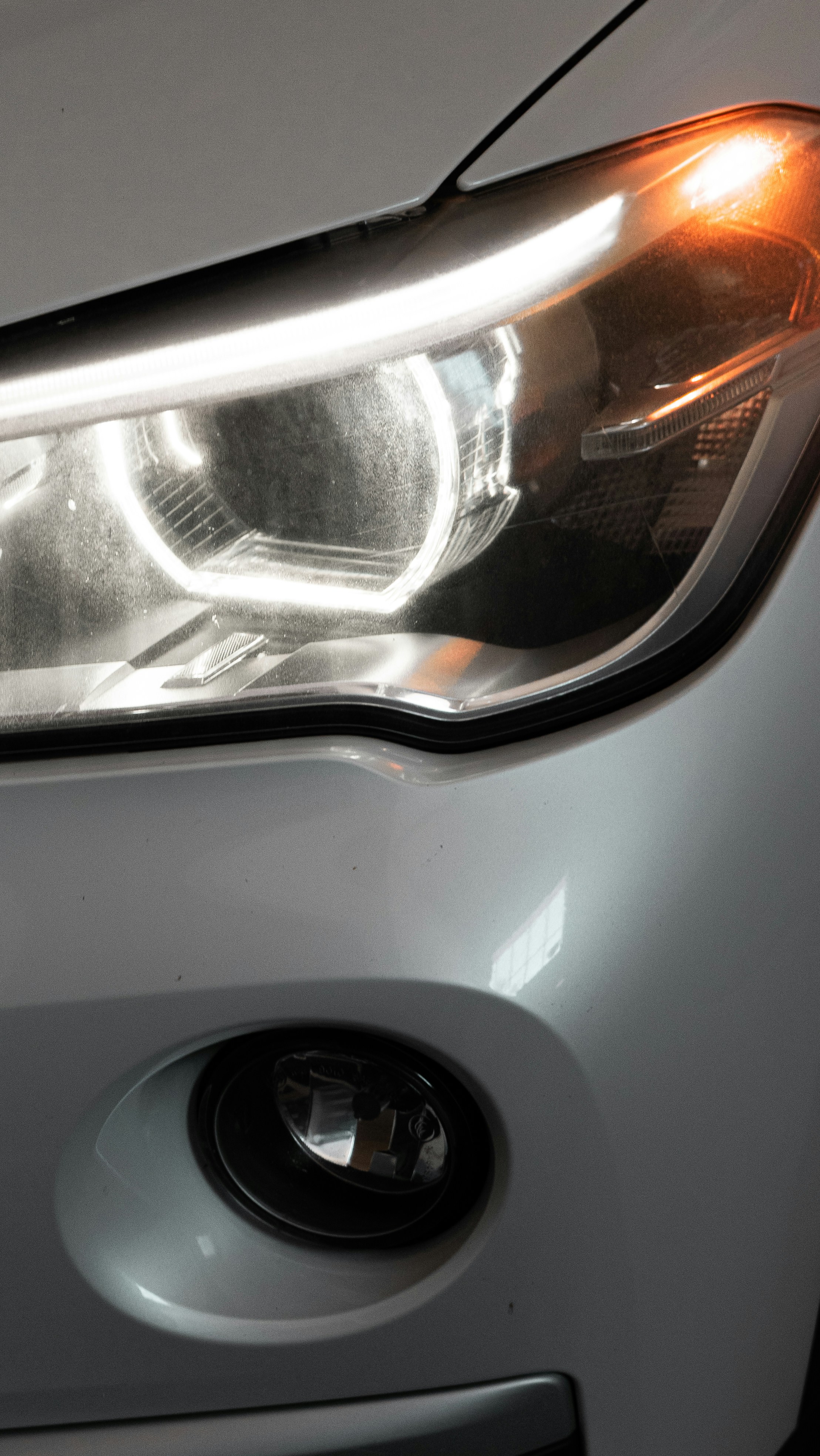 Close-Up of a Modern Car Headlight and Fog Lamp