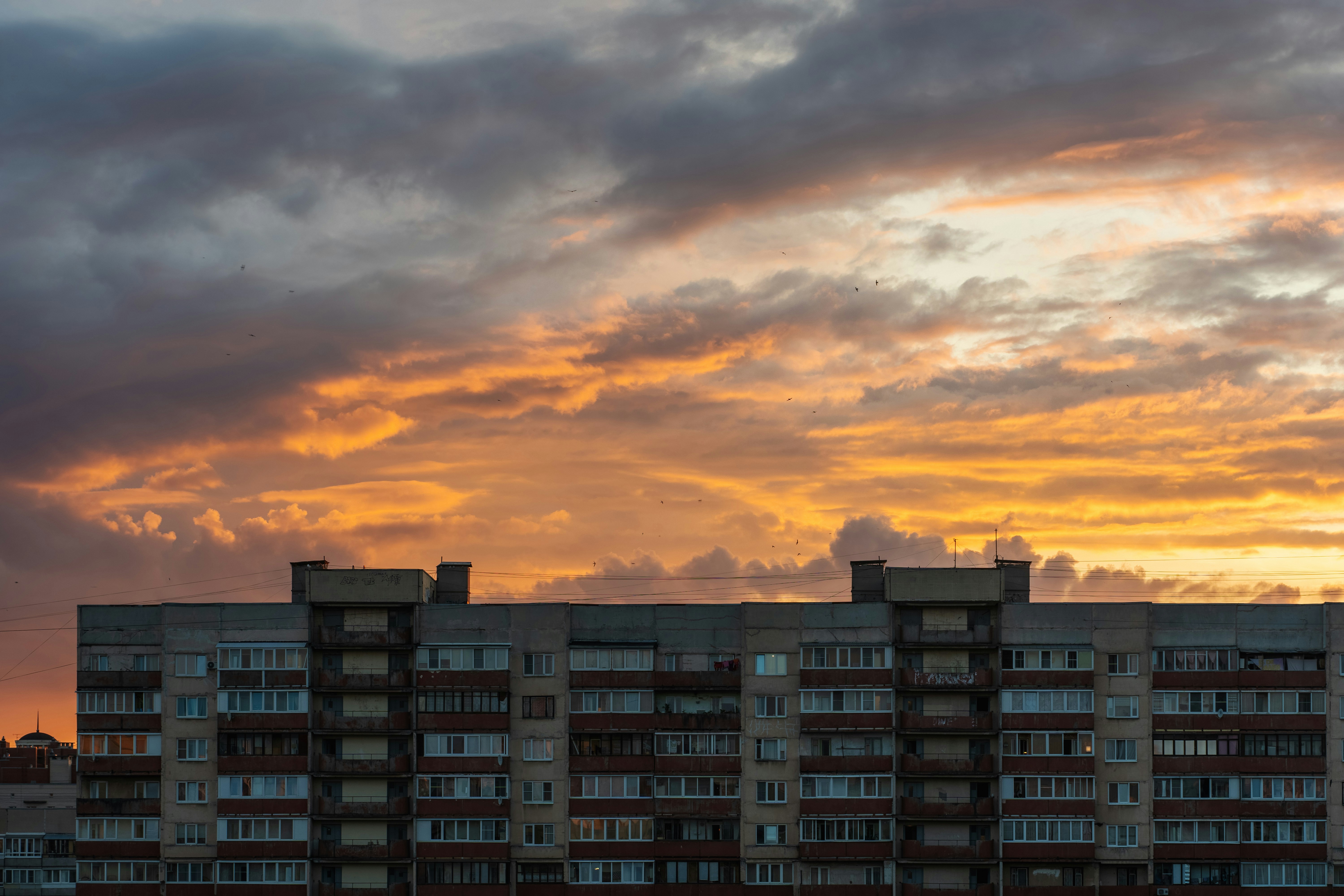 Sunset Over a Blocked Horizon: The Silent Row of Flats