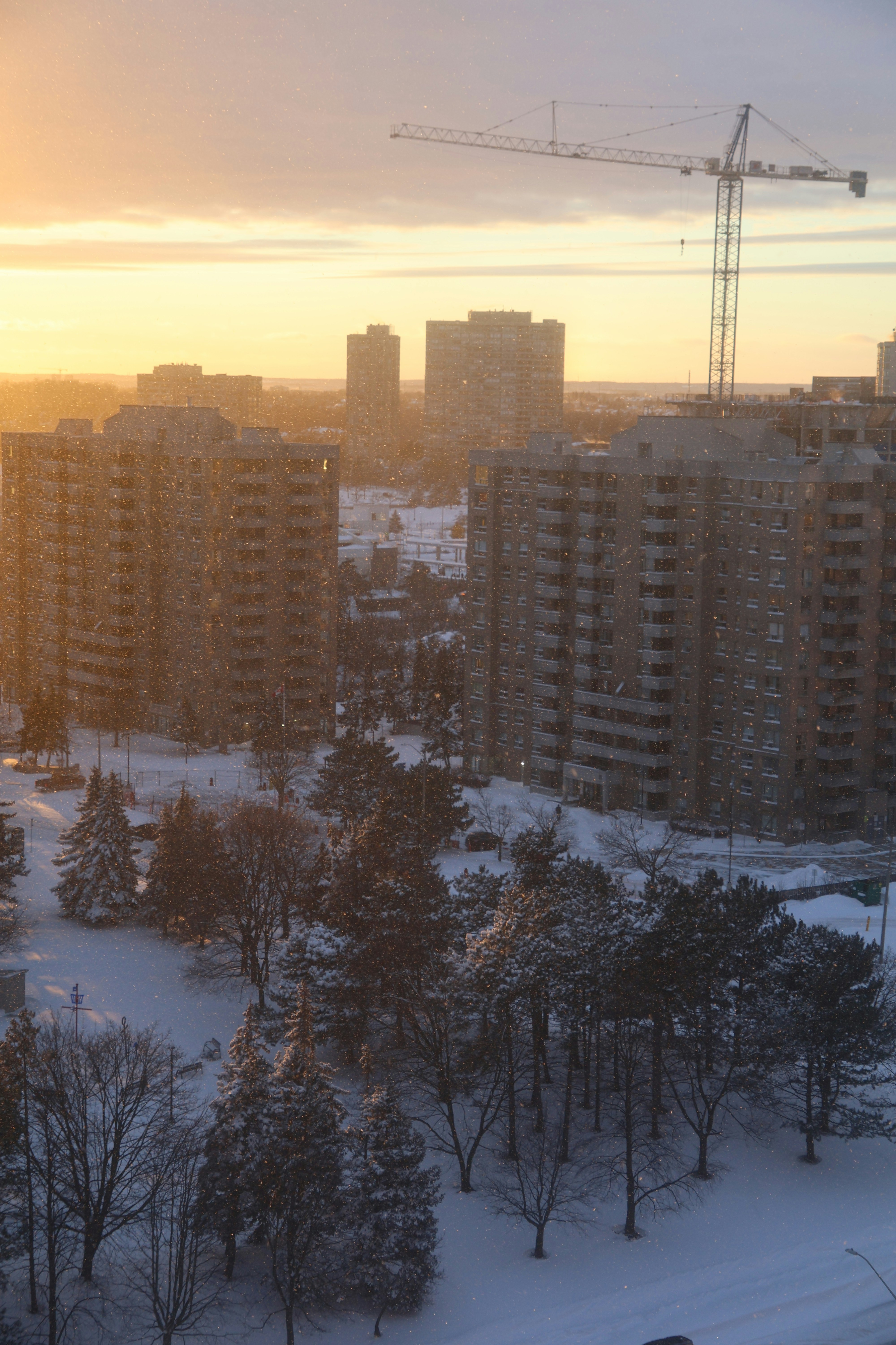 Sunrise Over a Snowbound Construction City