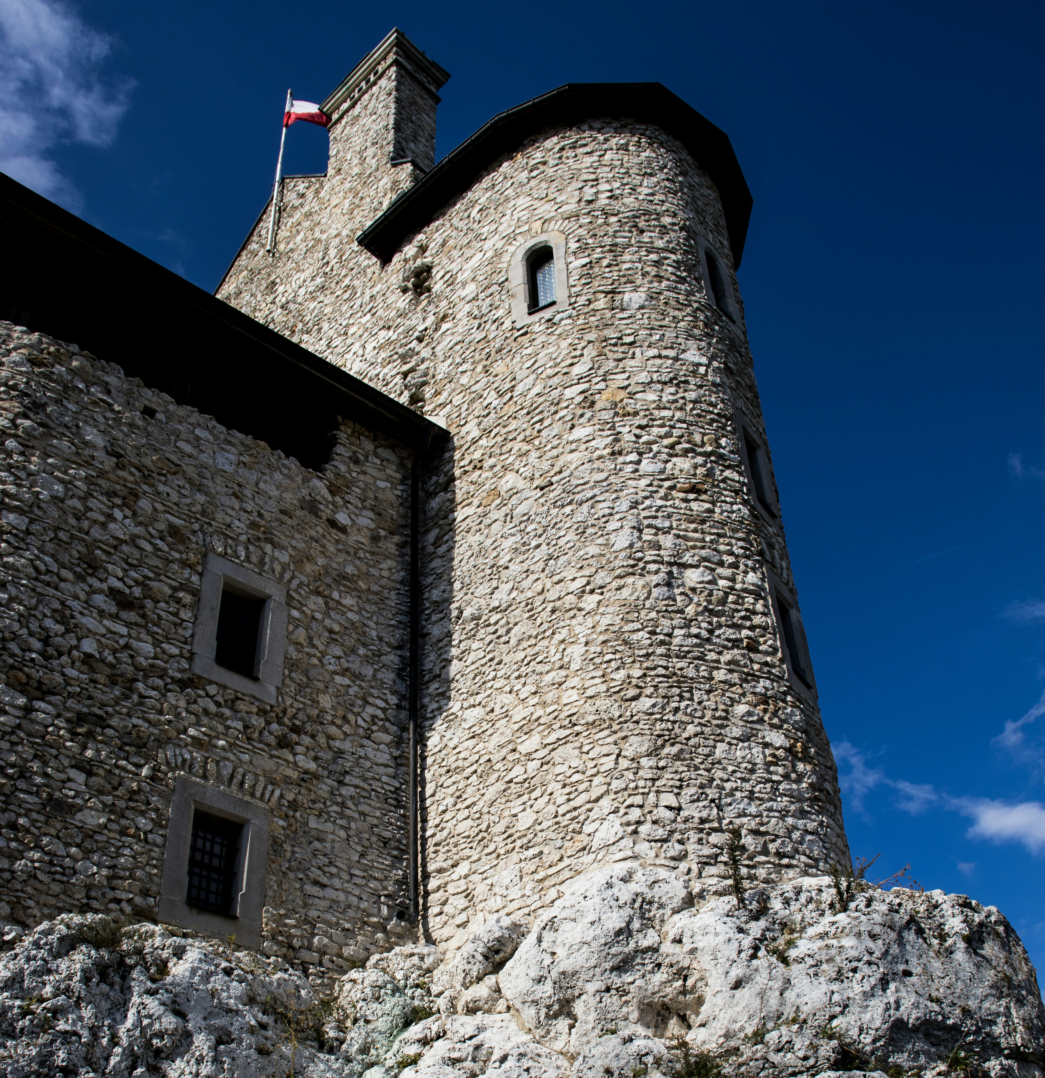 Stone Sentinel: A Towerrise Under a Pristine Blue Sky