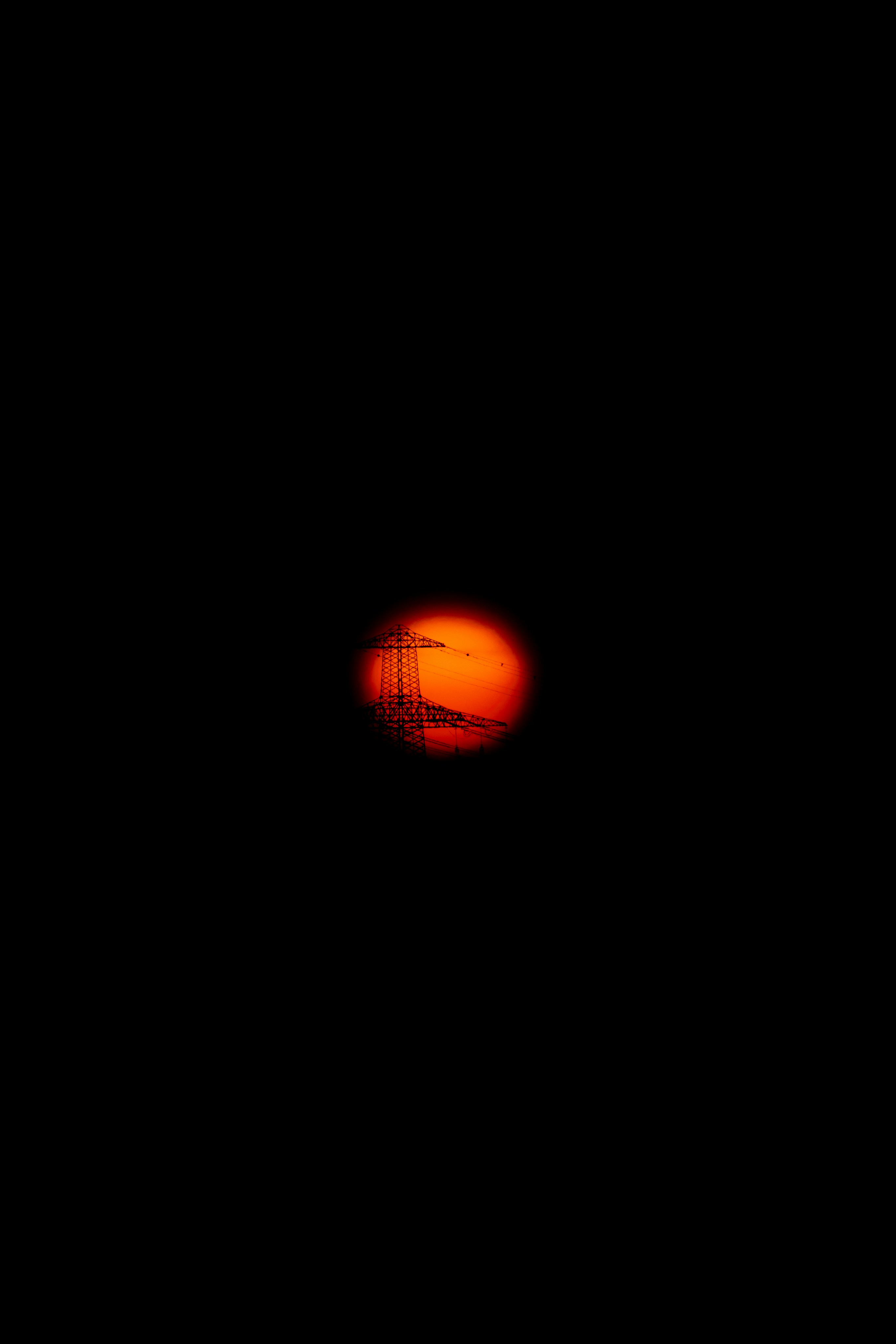 Crimson Sun Among Dark Horizons