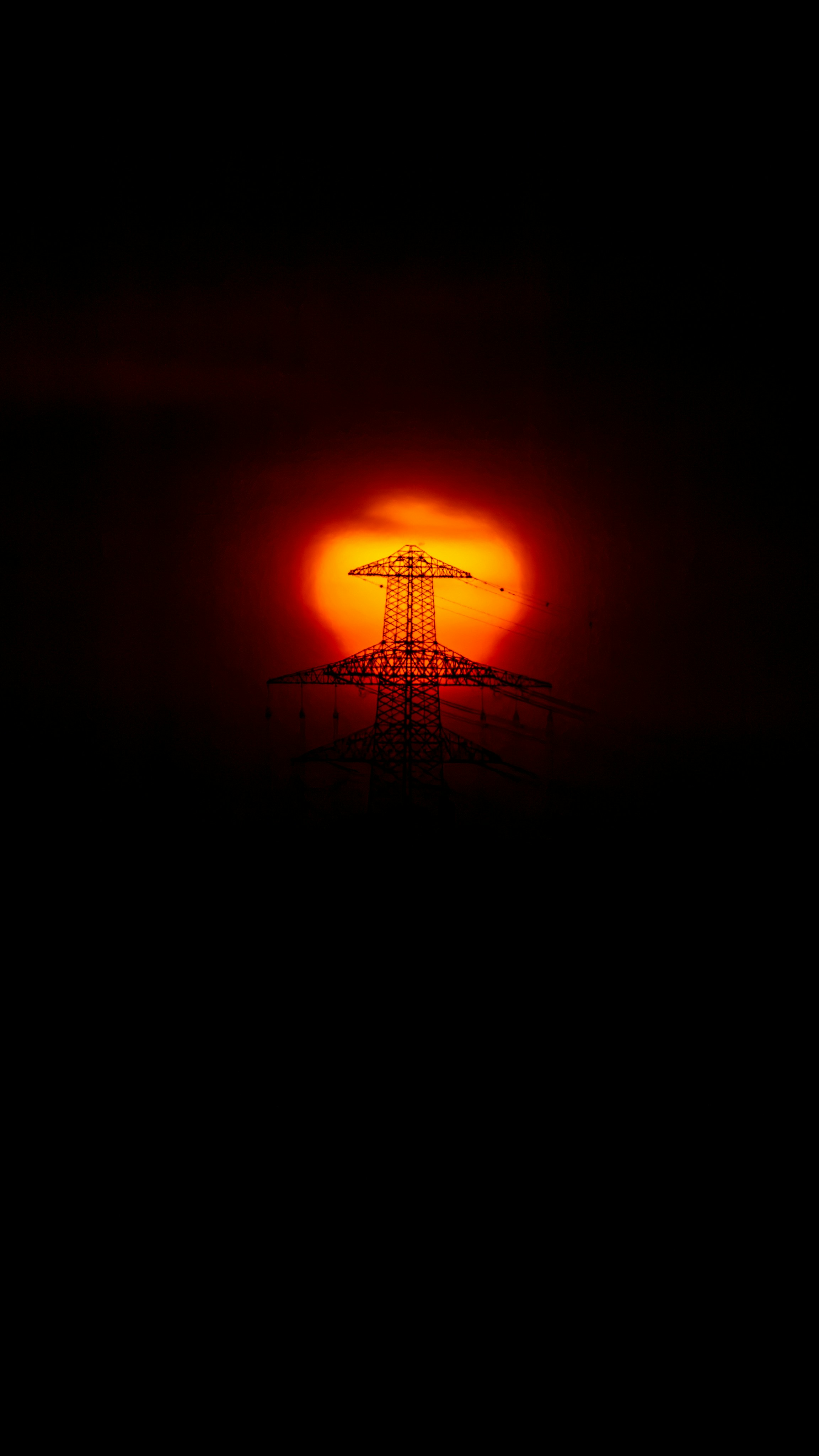 Sunlit Veil: A Power Tower Against the Dusk
