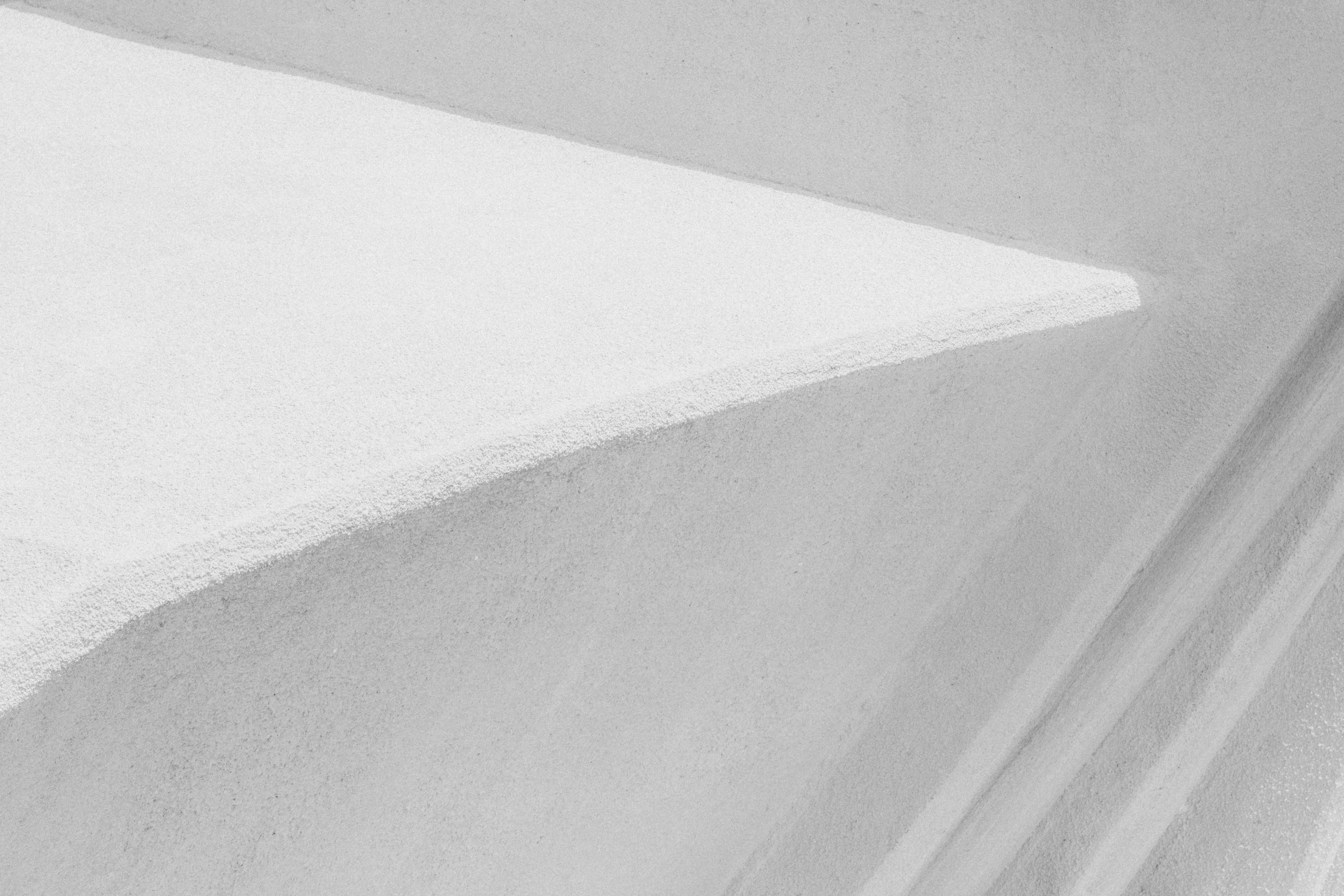 Monochrome Edge: A Gentle Slope in Soft Grey Tones