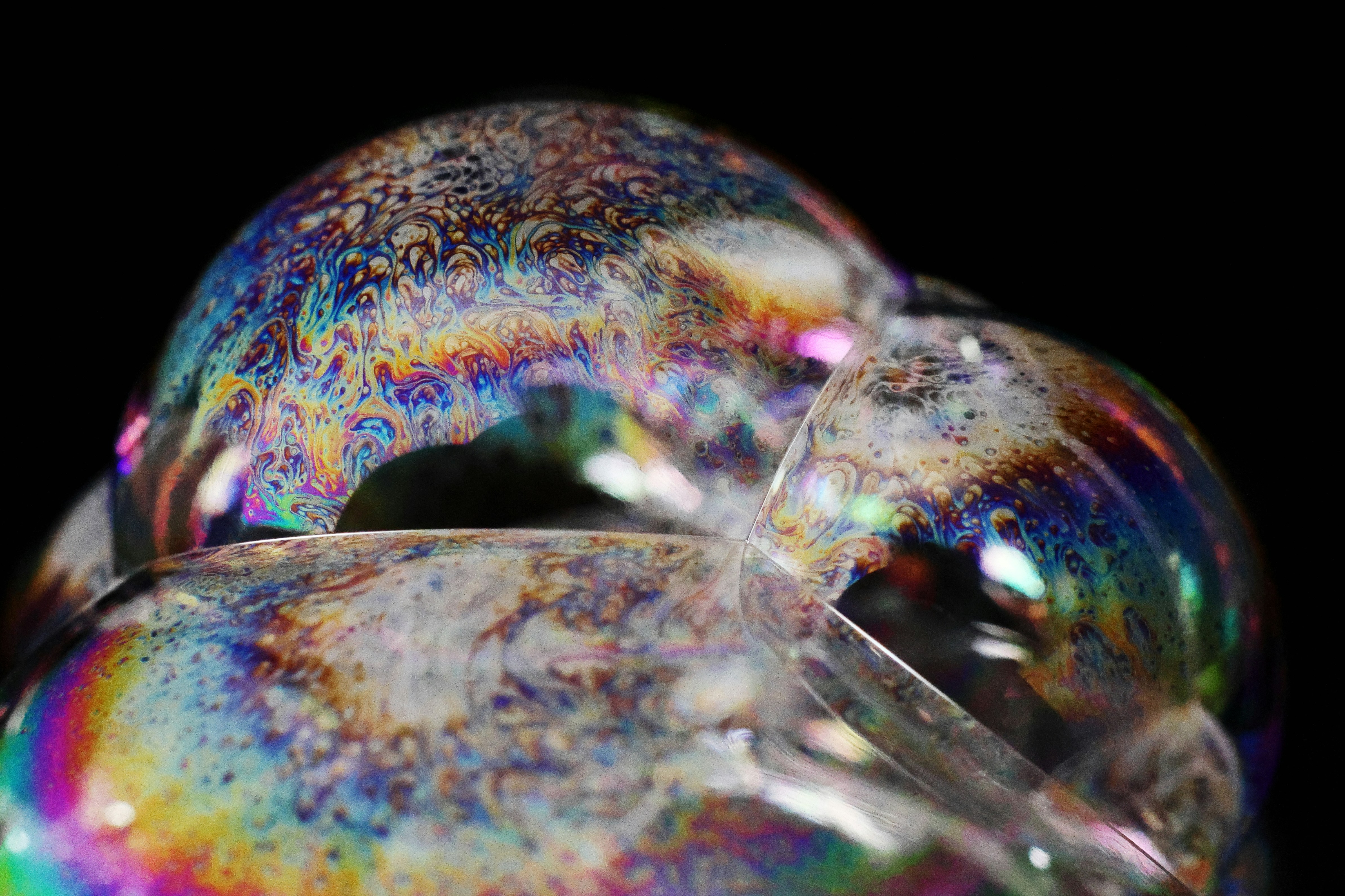 Iridescent Orbs: Colorful Bubbles under the Lens