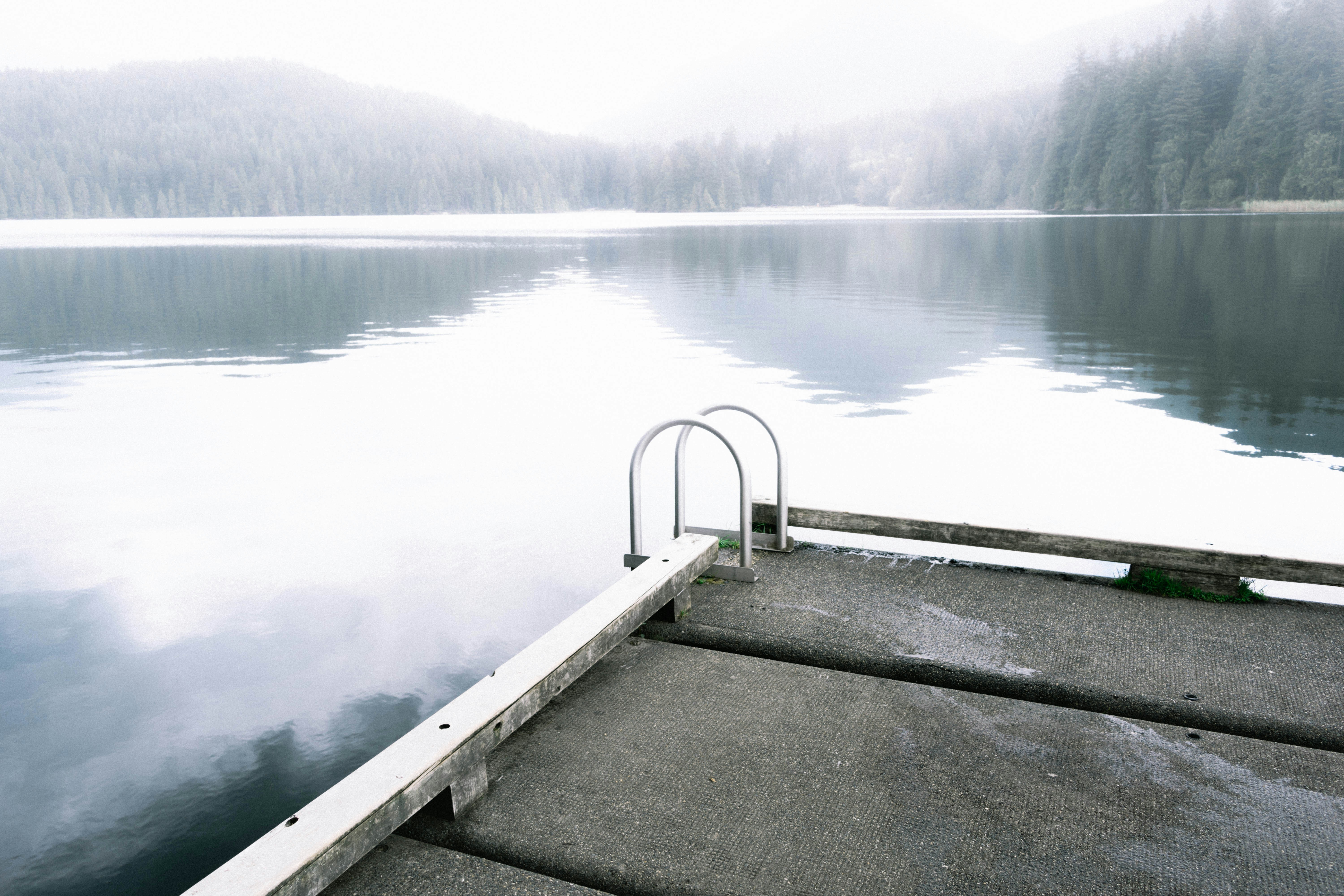 Quiet Lake Pier: Soft Light and Slumbering Waters