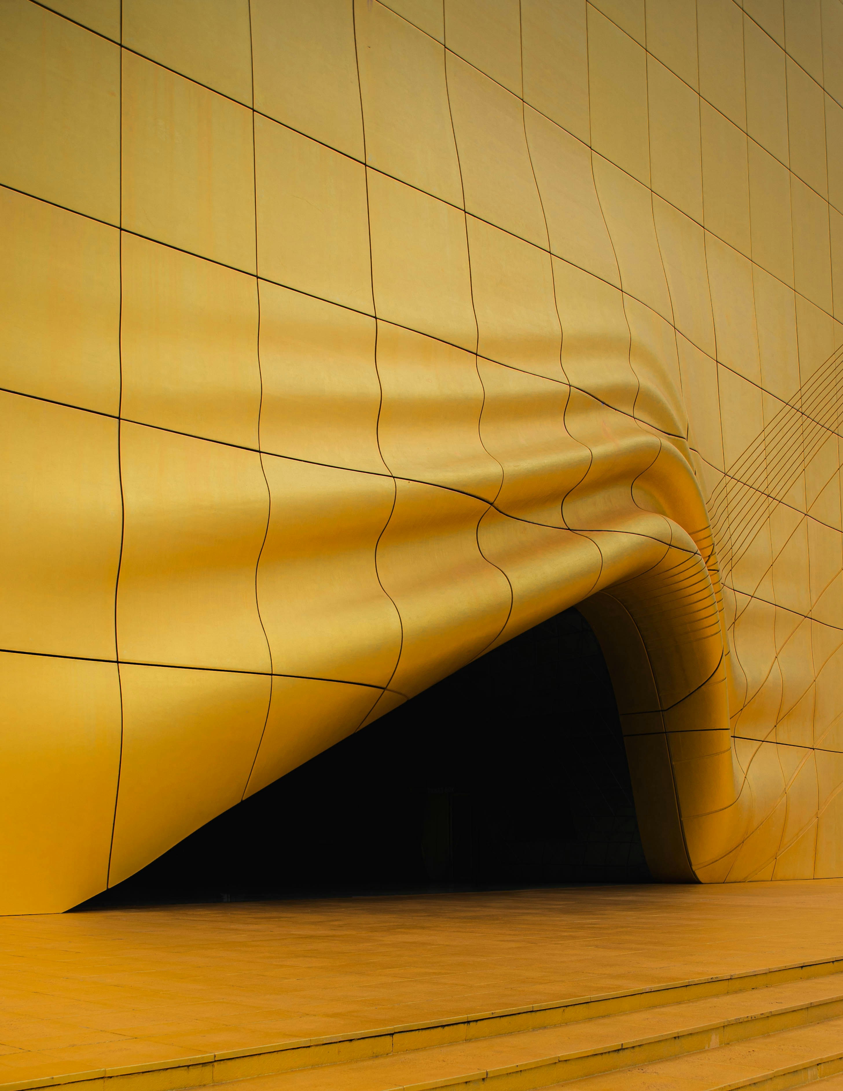 Liquid Gold: The Secret Arch of a Golden Facade