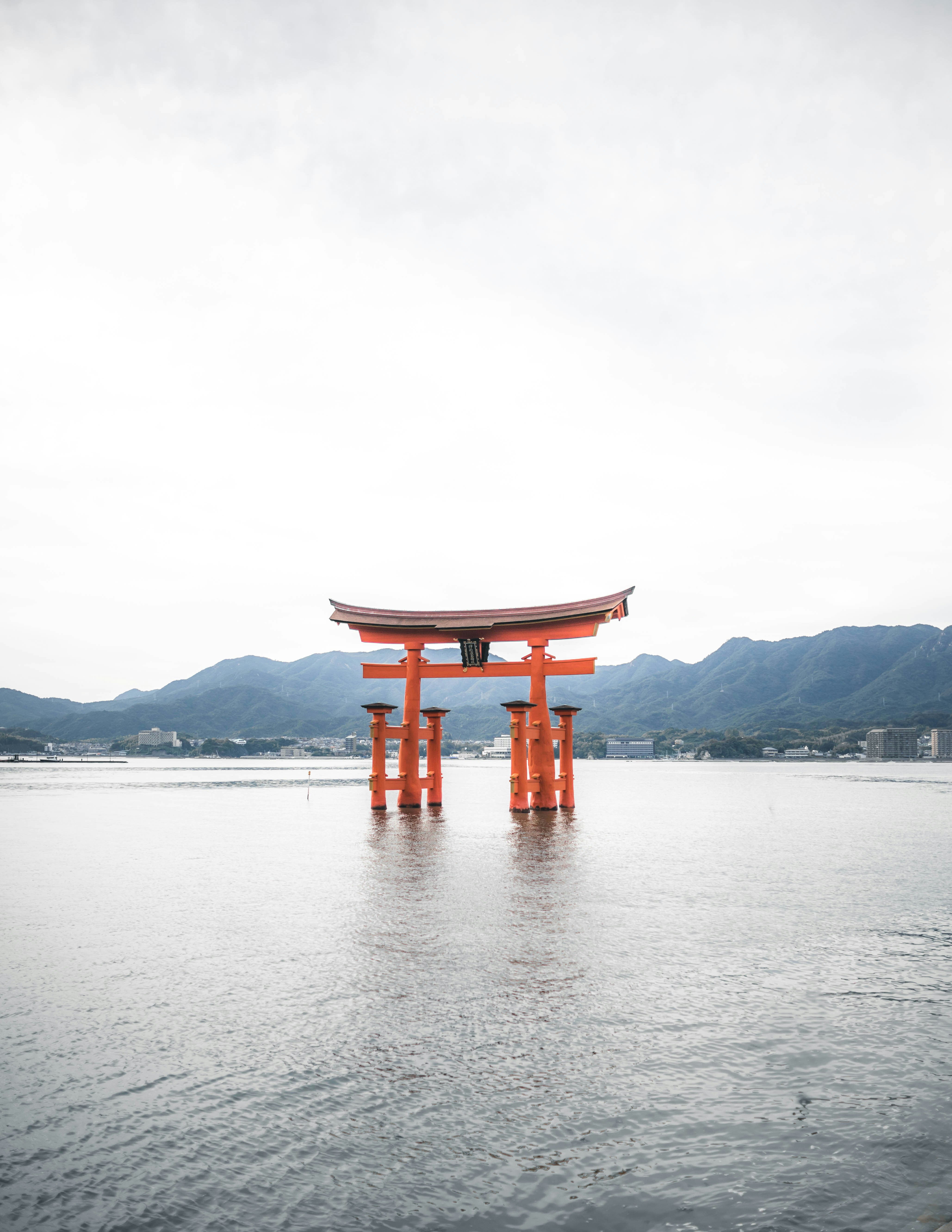 Floating Gate: The Red Torii Rests Upon a Quiet Inland Sea