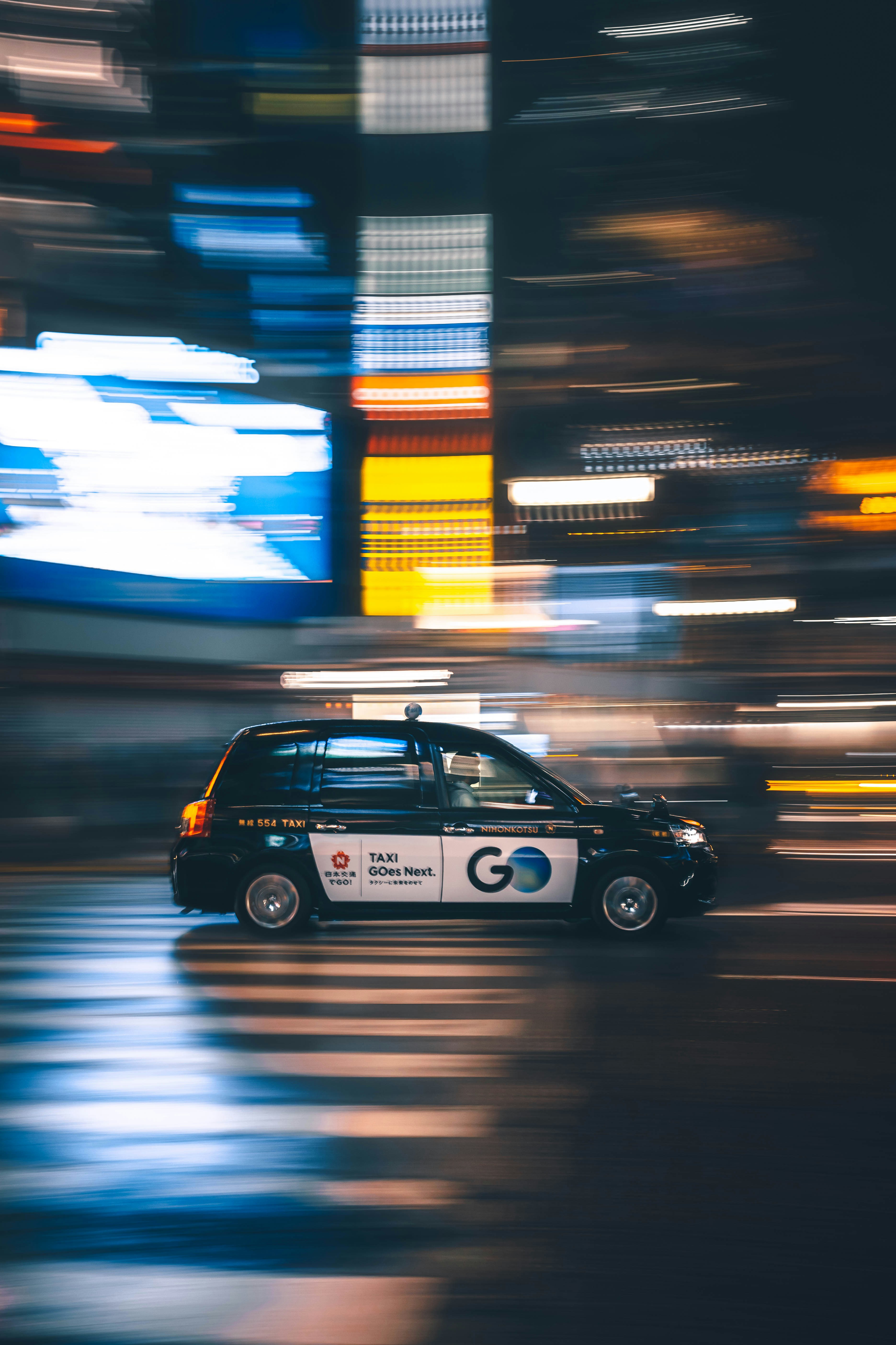 Neon Blur: A City Taxi in Night Transit