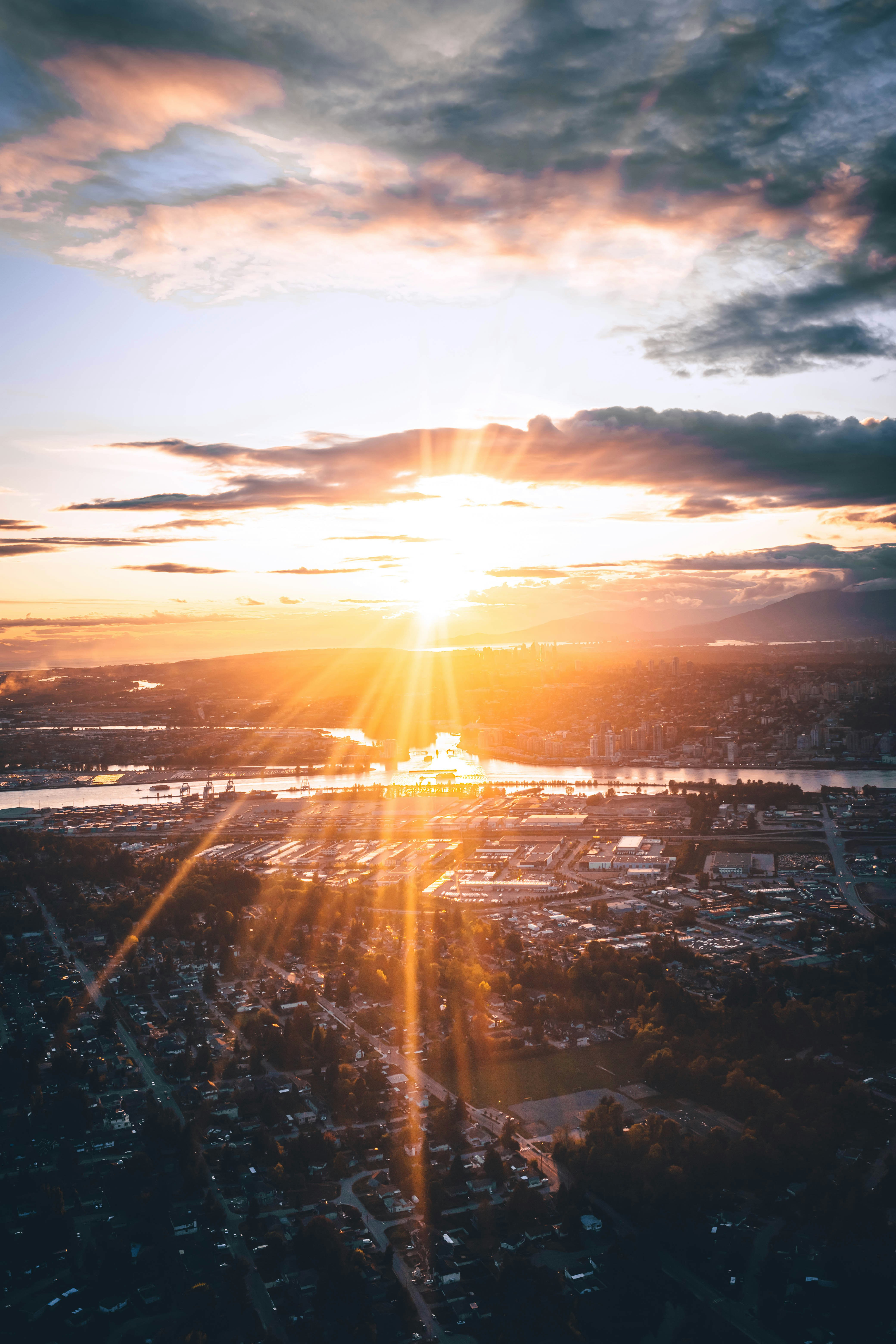 Sunburst Over the Quiet City: A Golden Hour Across Town