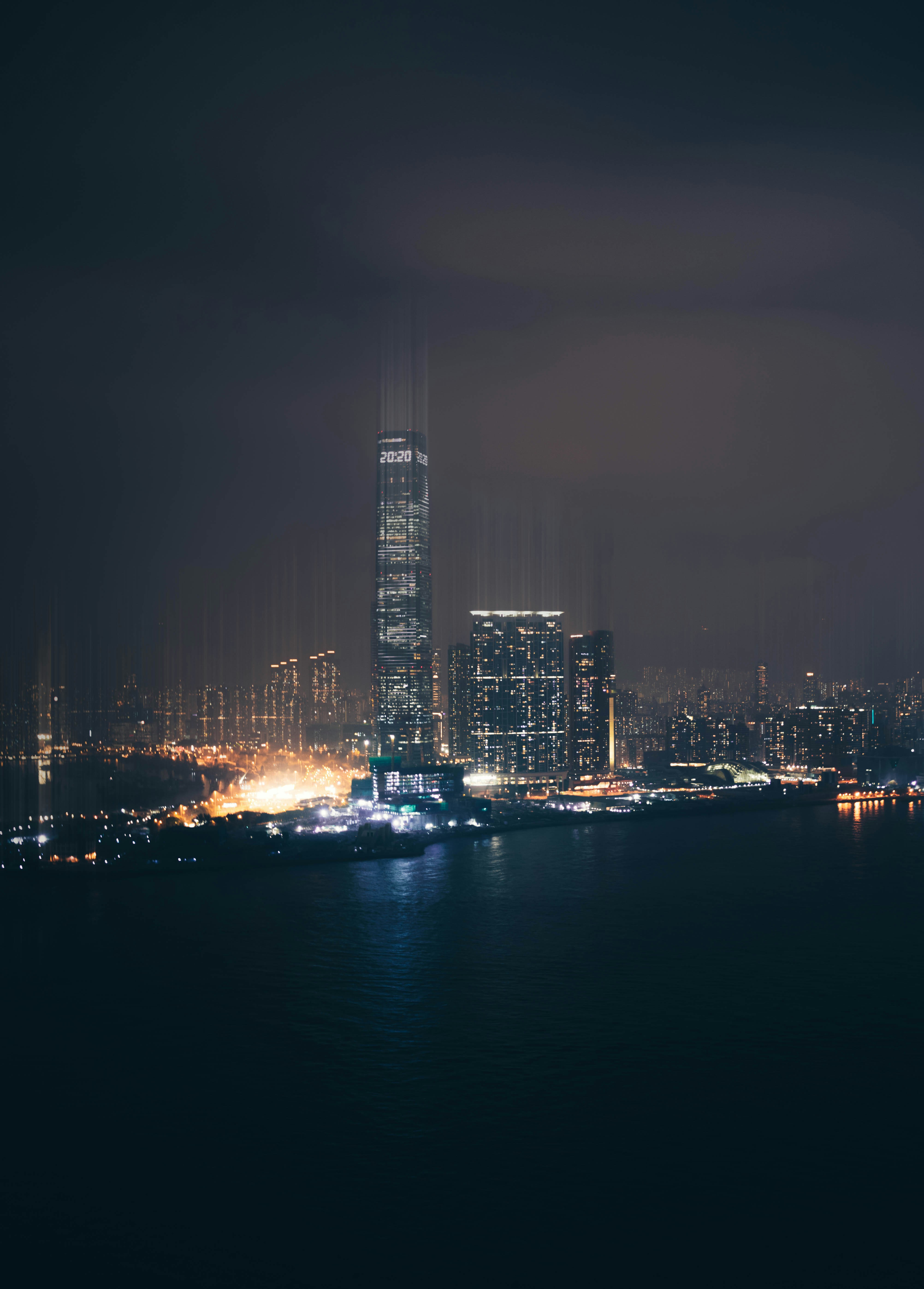 Night Skyline: Glowing Harbor Beneath a Silent Sky